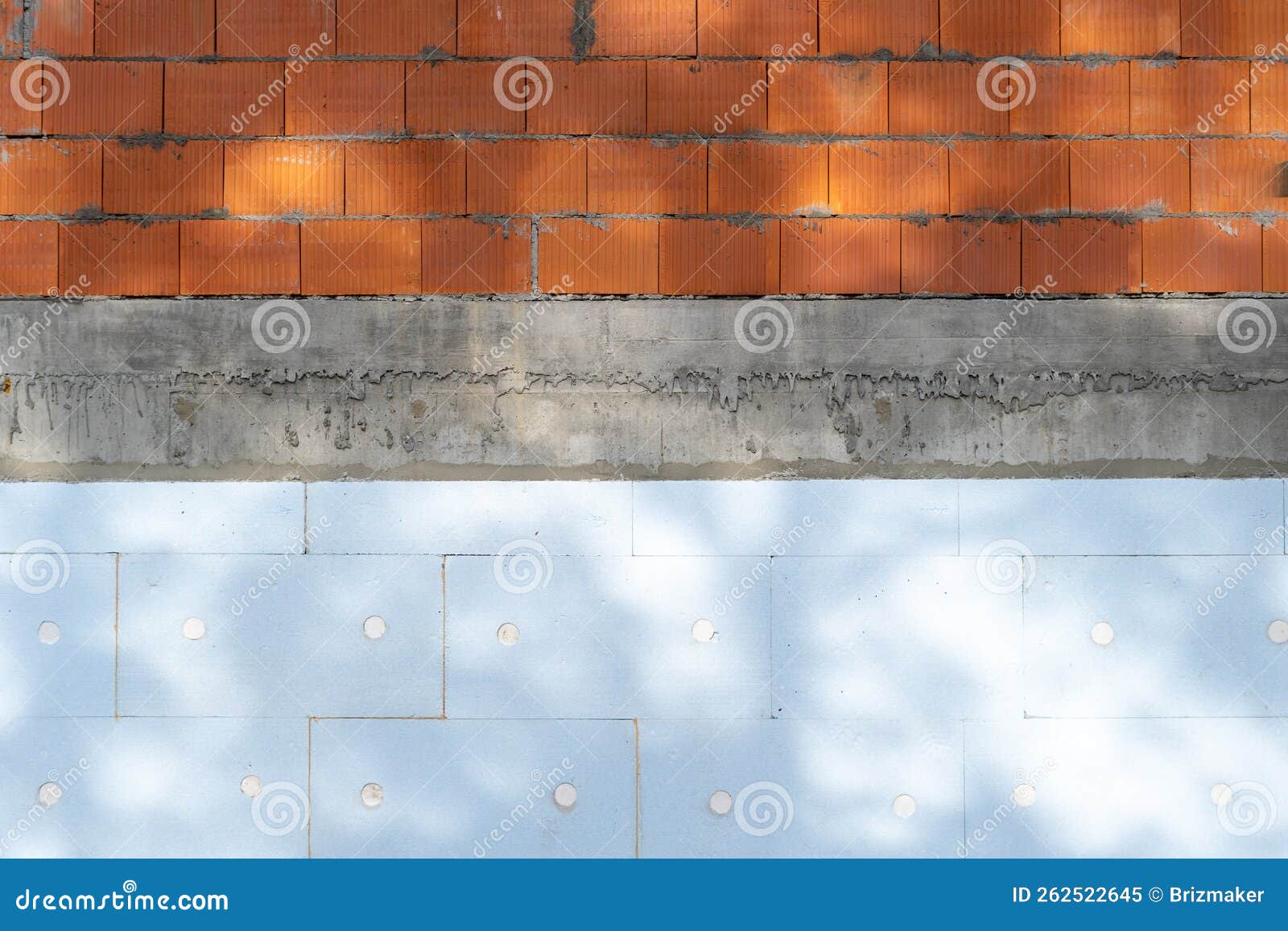 Building Wall with Red Brick, Panel Blocks and Styrofoam Insulation ...