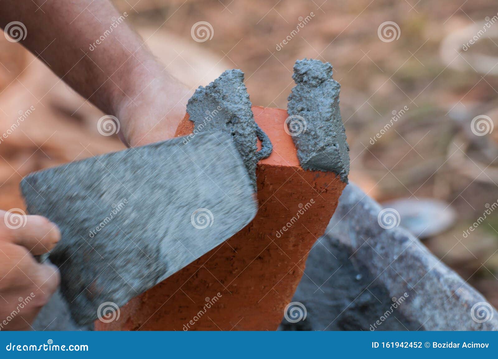 Building a Wall with Red Brick. Working with Bricks for Building a Wall ...