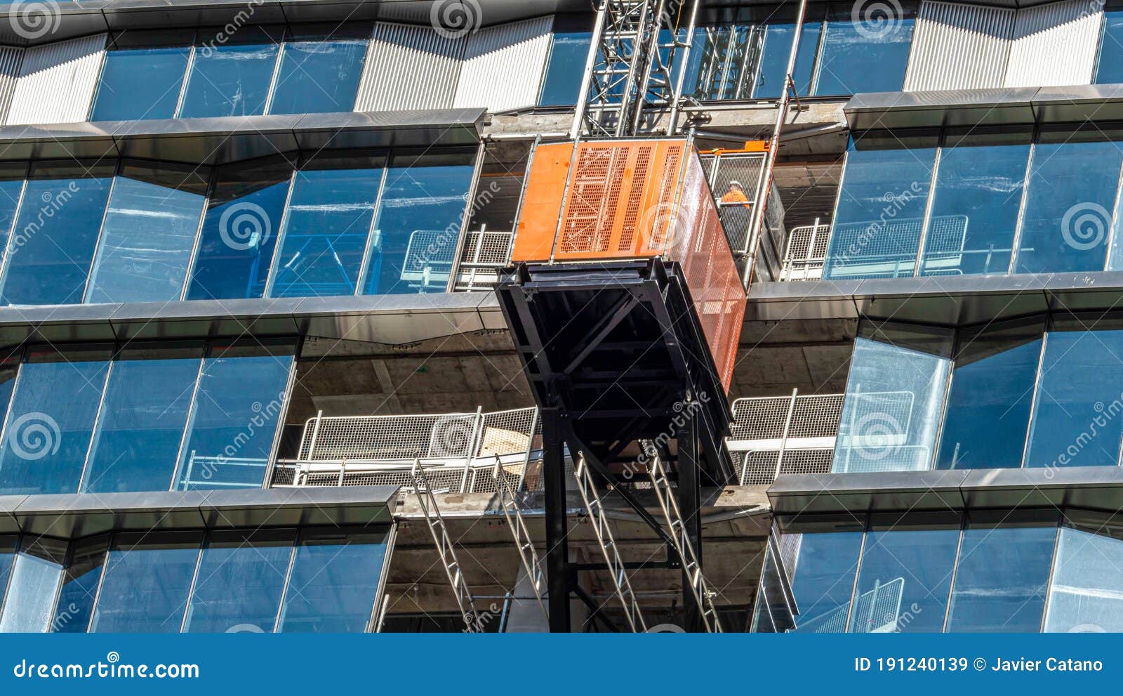 Construction Site of Office Building with Industrial Elevator Stock ...