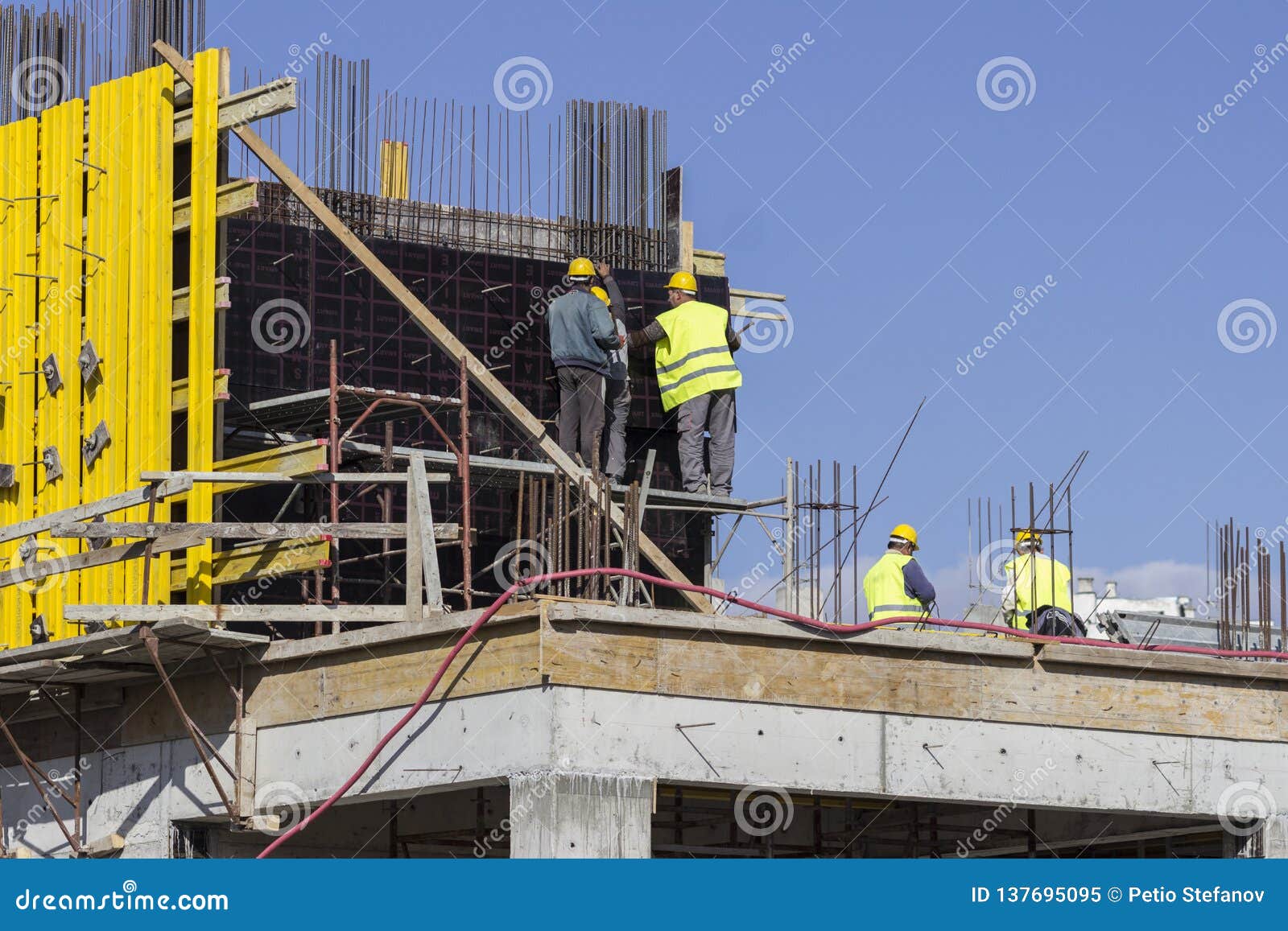 Building Workers on a Construction Site Editorial Image - Image of ...