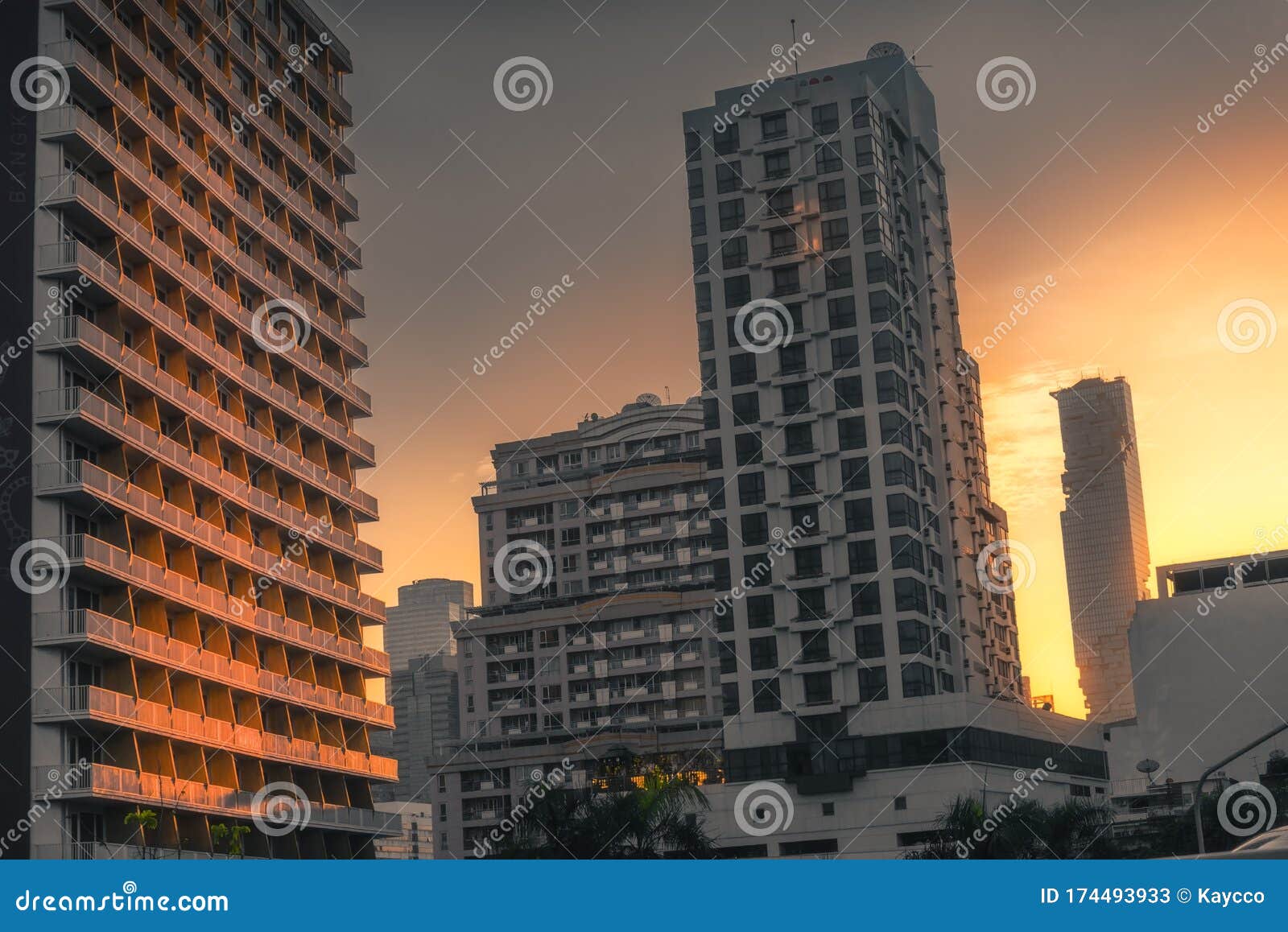 Buildings in the City at Sunset Stock Image - Image of clouds, silom ...