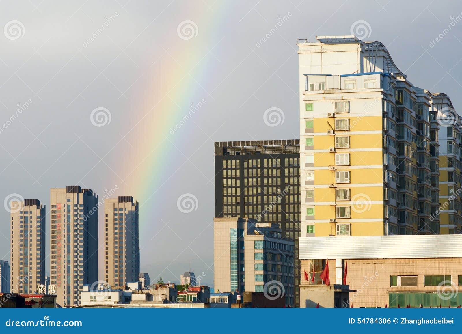 Buildings and rainbow stock photo. Image of scenic, skyline - 54784306