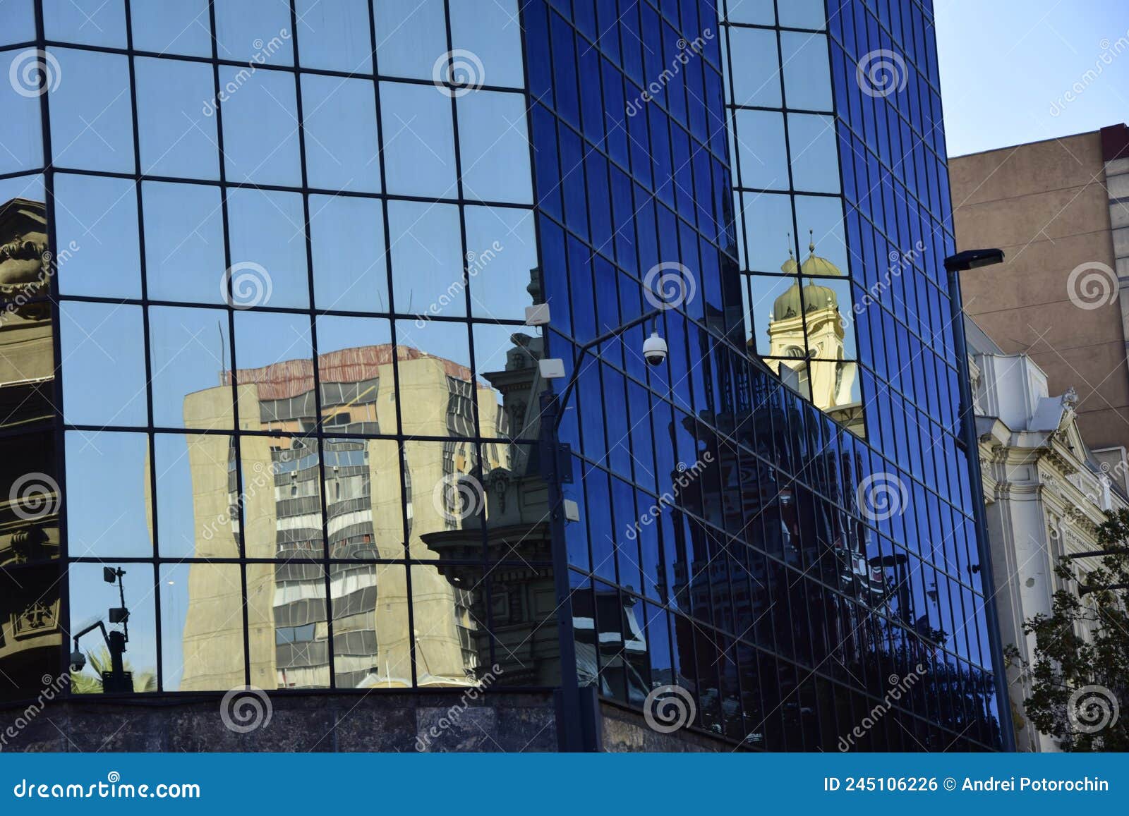 The Buildings are Reflected in the Mirrored Facade of a Modern ...