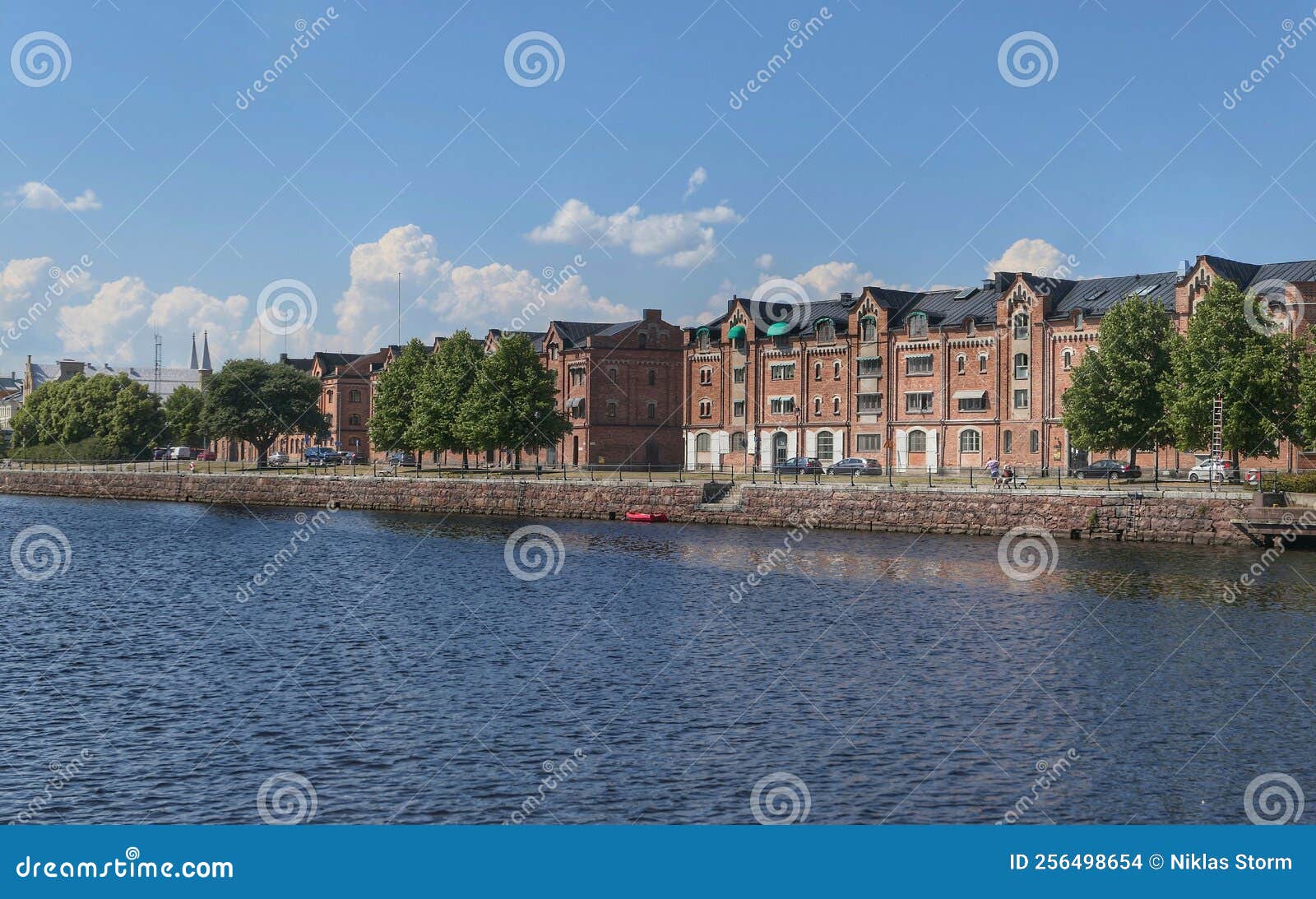 Buildings by River during Summer Stock Photo - Image of vacation, river ...