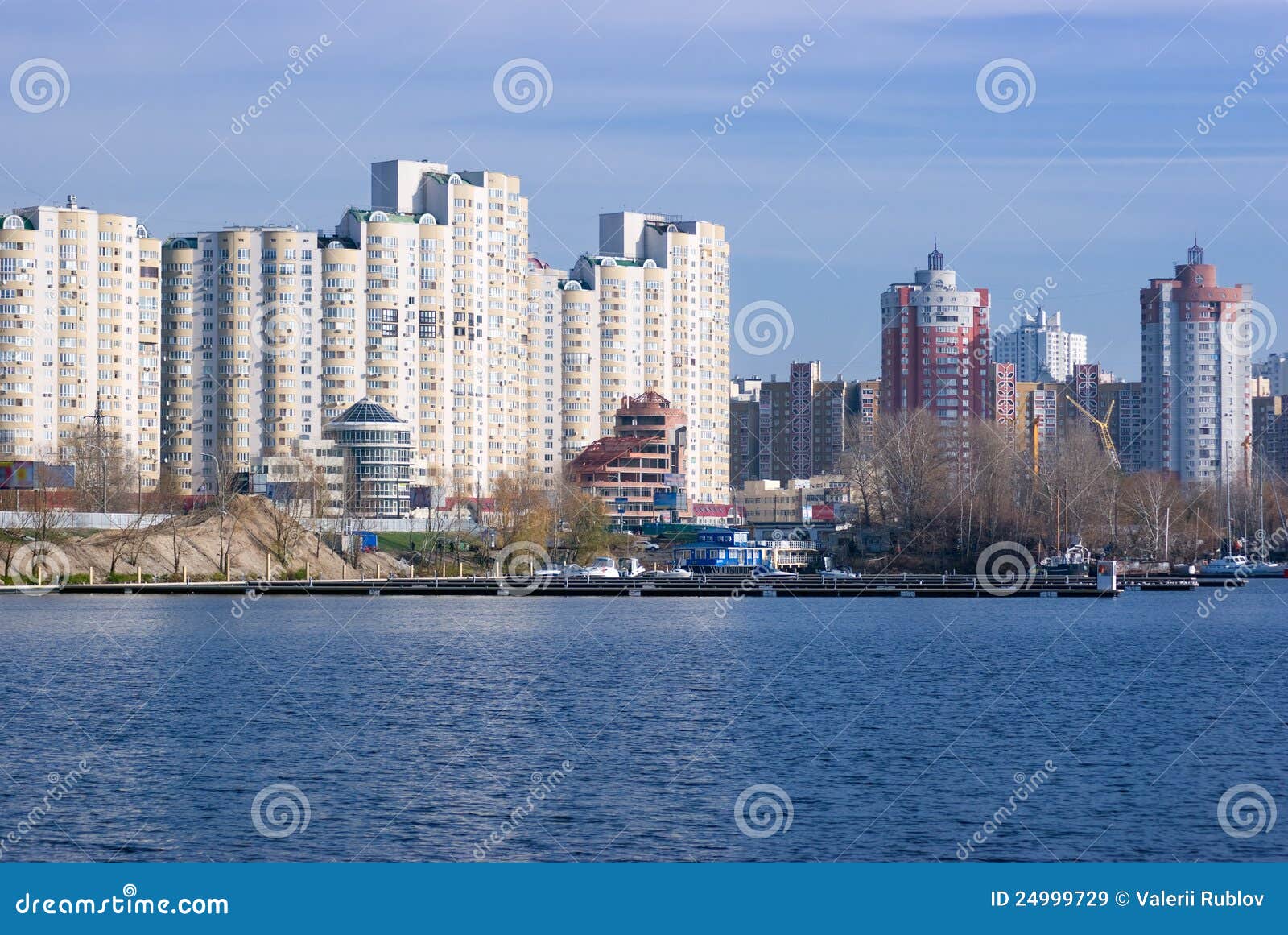 Buildings by the riverside stock image. Image of real - 24999729