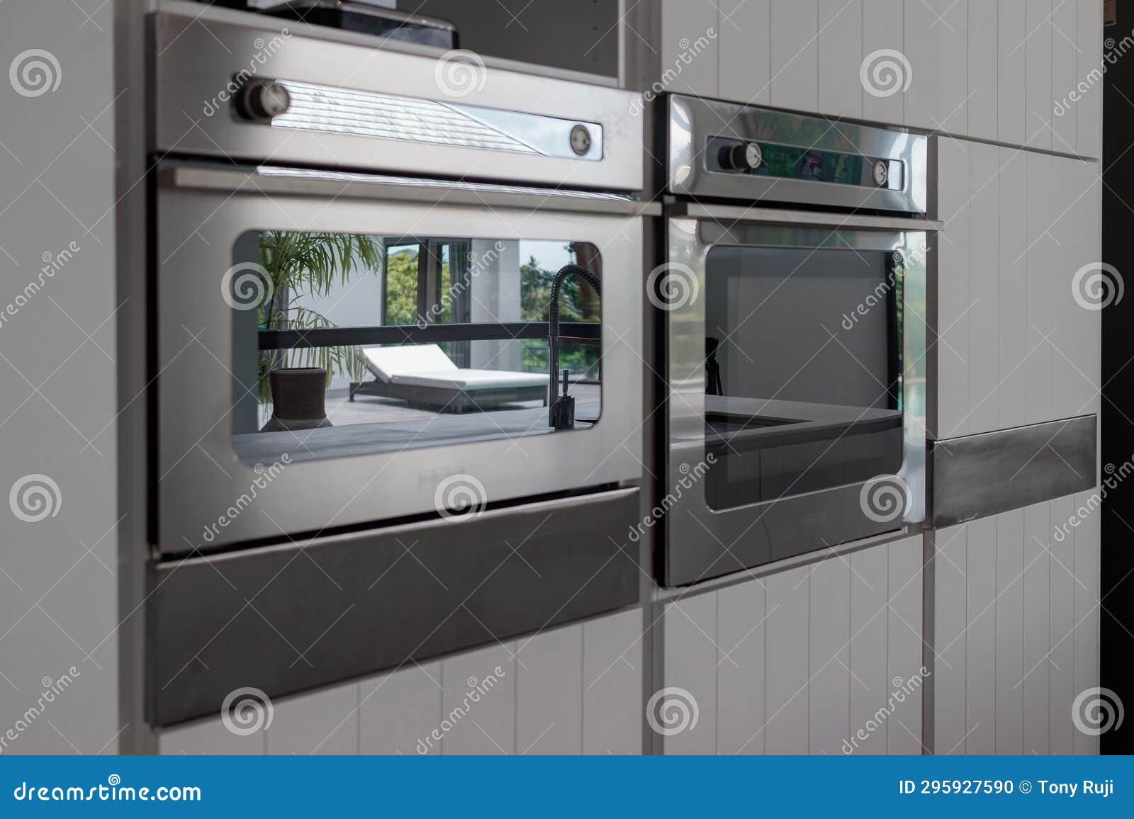 Built-in Stainless Steel Oven in Large Luxury Kitchen Stock Photo ...