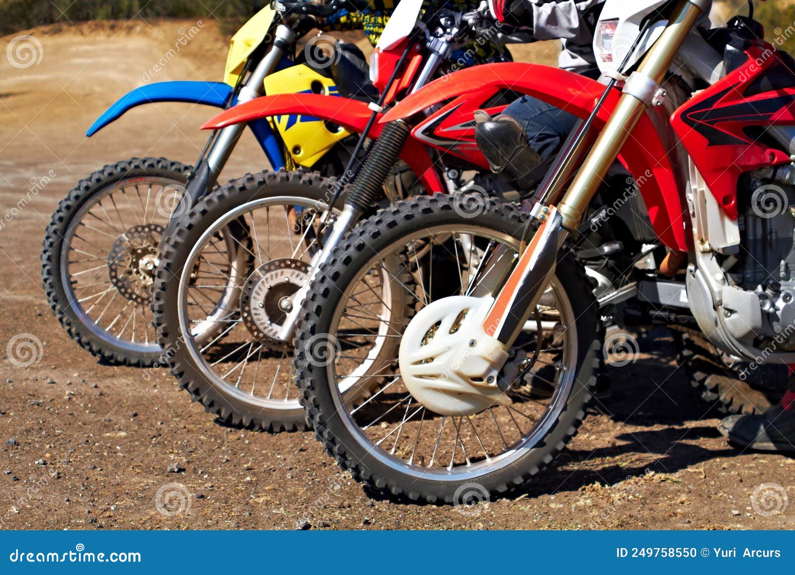 Built for Tough Terrain. Three Dirt Bikes Standing in a Row. Stock ...
