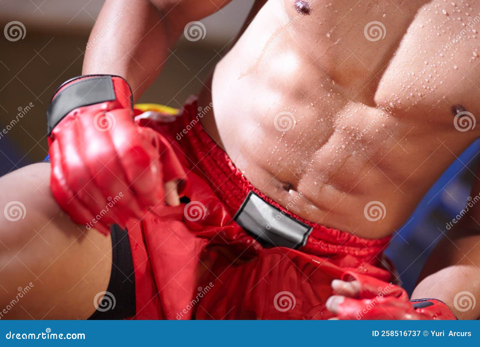 Built for Victory. Cropped Image of a Young Fighter Sitting Down. Stock ...