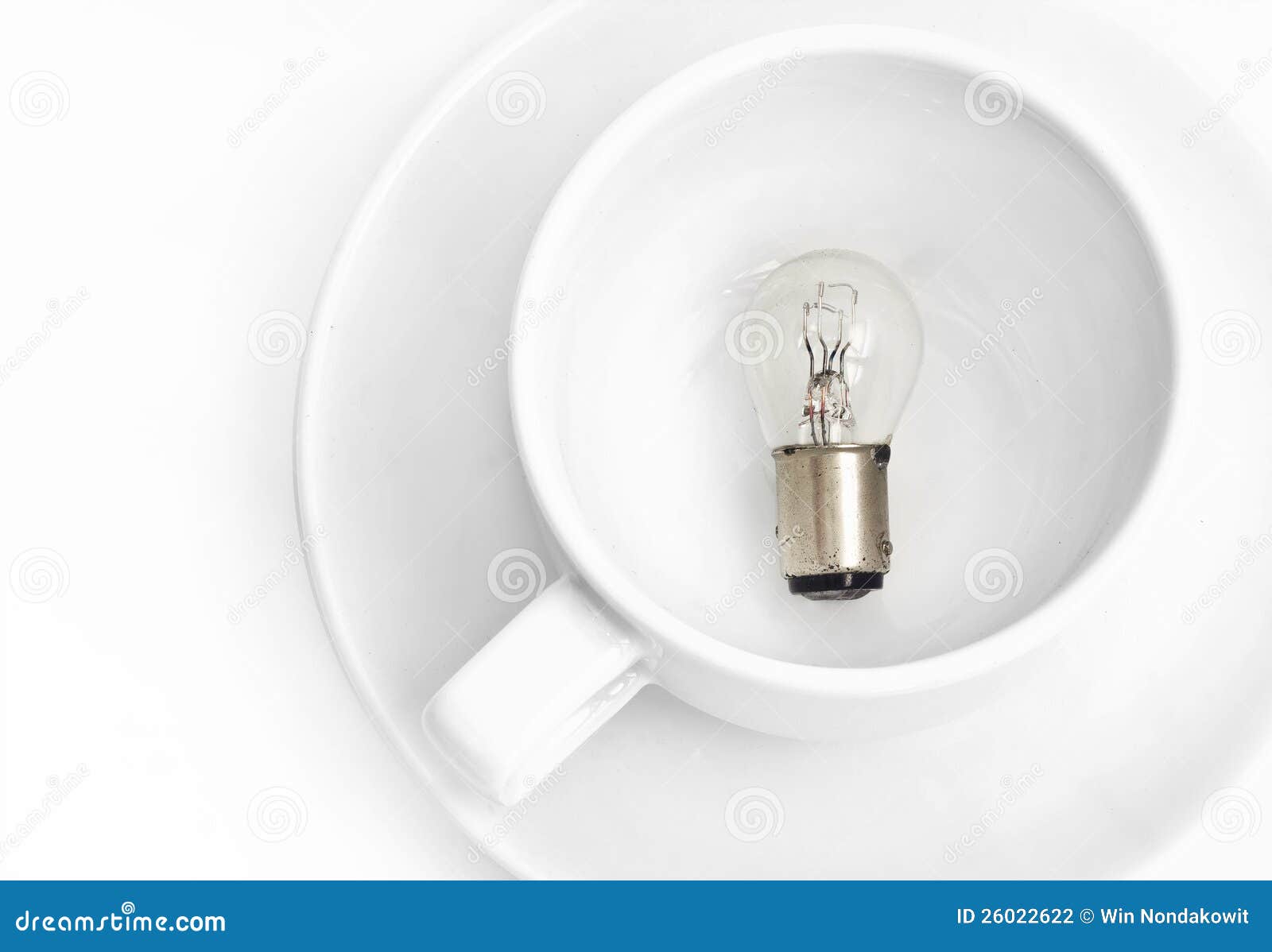 Bulb in cup stock photo. Image of electric, solution - 26022622