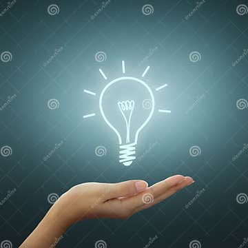 Bulb light drawing on hand stock photo. Image of business - 22743452