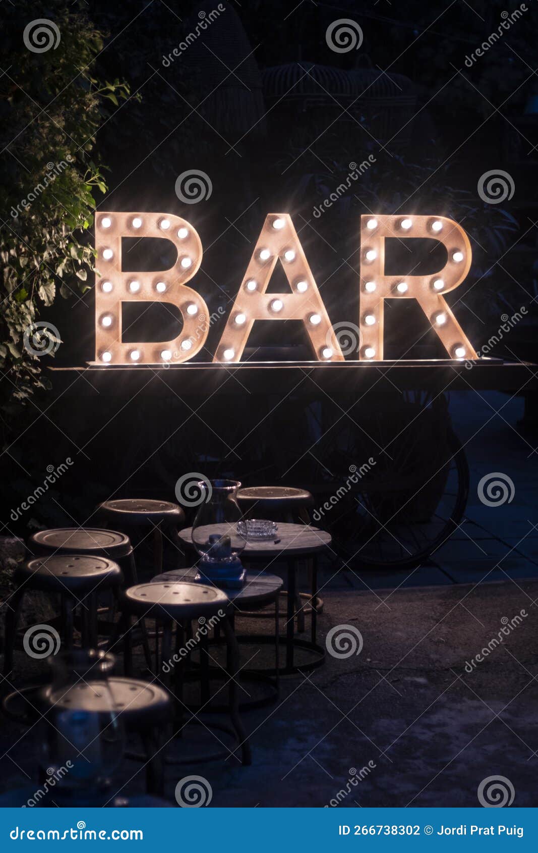 Bulb Lights Shaping BAR Word on a Pub Terrace on a Dark Evening Stock ...