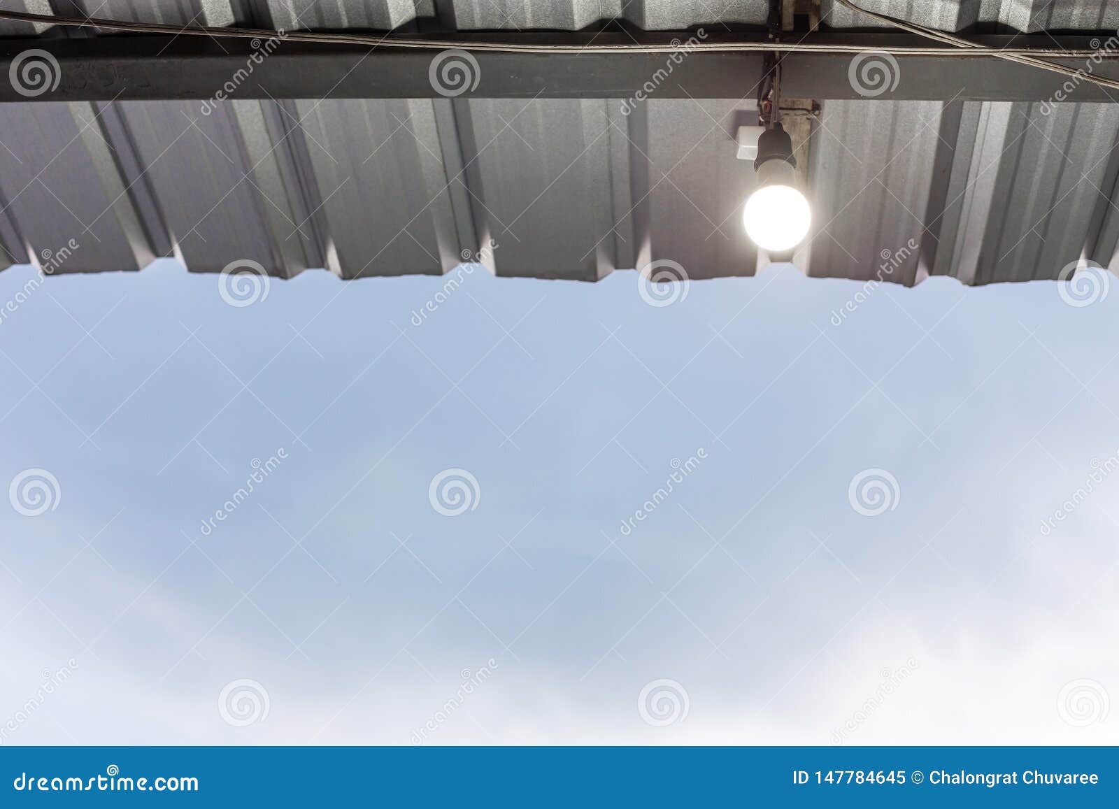 Bulb on metal sheet roof stock image. Image of industrial - 147784645