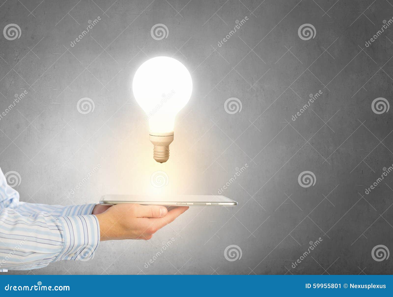 Bulb on tablet stock image. Image of closeup, innovation - 59955801