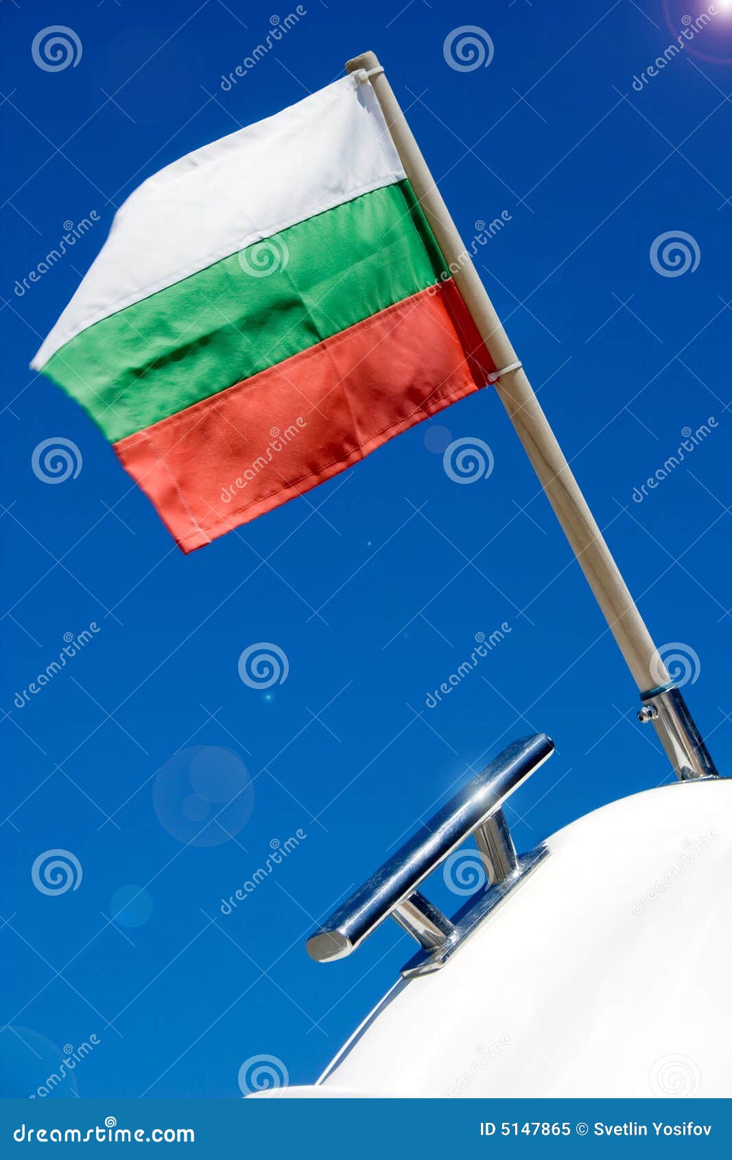Bulgaria Flag Is Depicted On A Table On Which The Human Hand Folds A ...