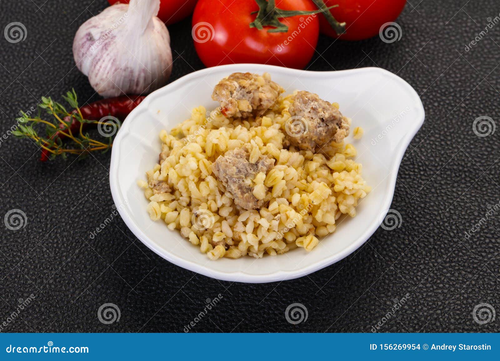 Bulgur with meat stock photo. Image of herbs, pilaf - 156269954