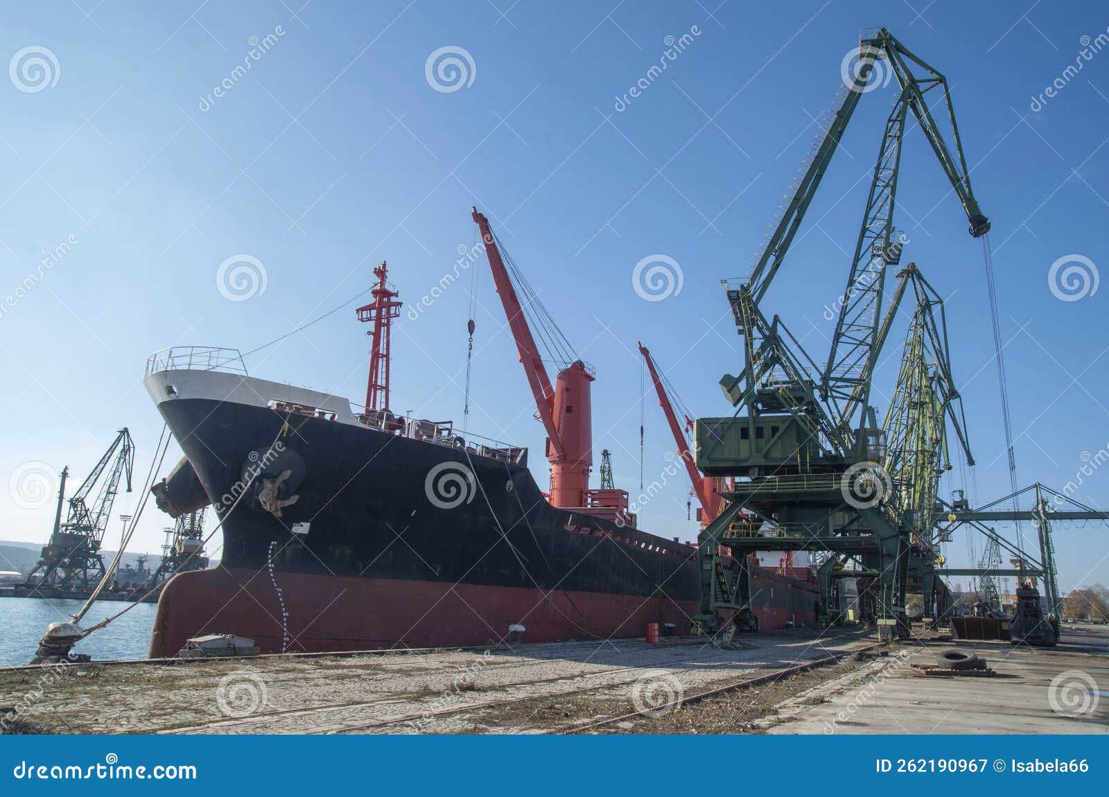 Bulk Cargo Ship with Cranes at Quay with Cranes Editorial Photography ...