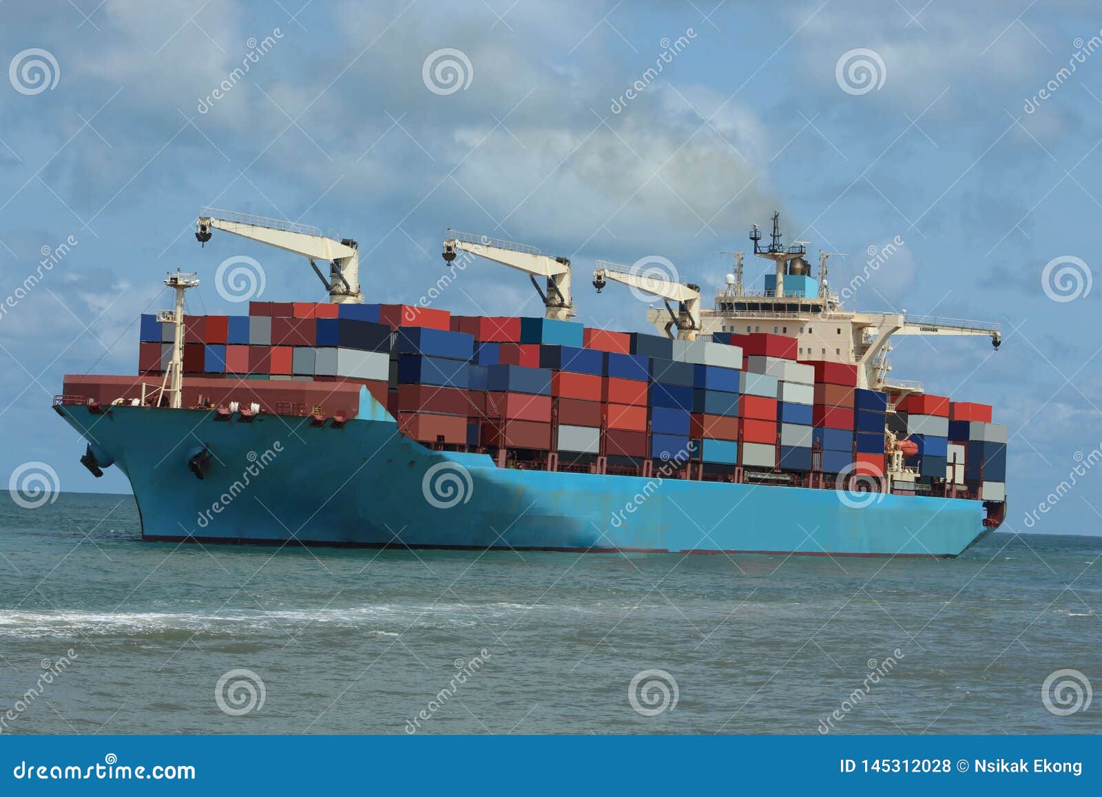 Bulk Cargo Ship Loaded with Containers is Sailing in the Ocean Stock ...