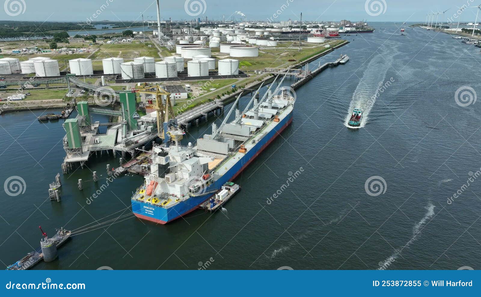 Bulk Carrier Ship at Port Offloading Cargo and Commodities Stock Video ...