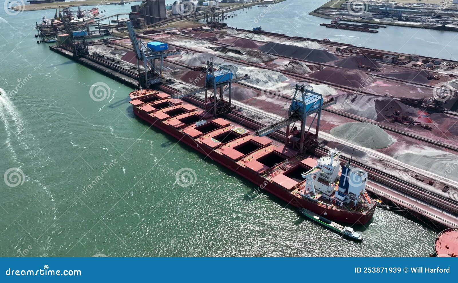 Bulk Carrier Ship Offloading Cargo by Crane for Processing Stock Video ...