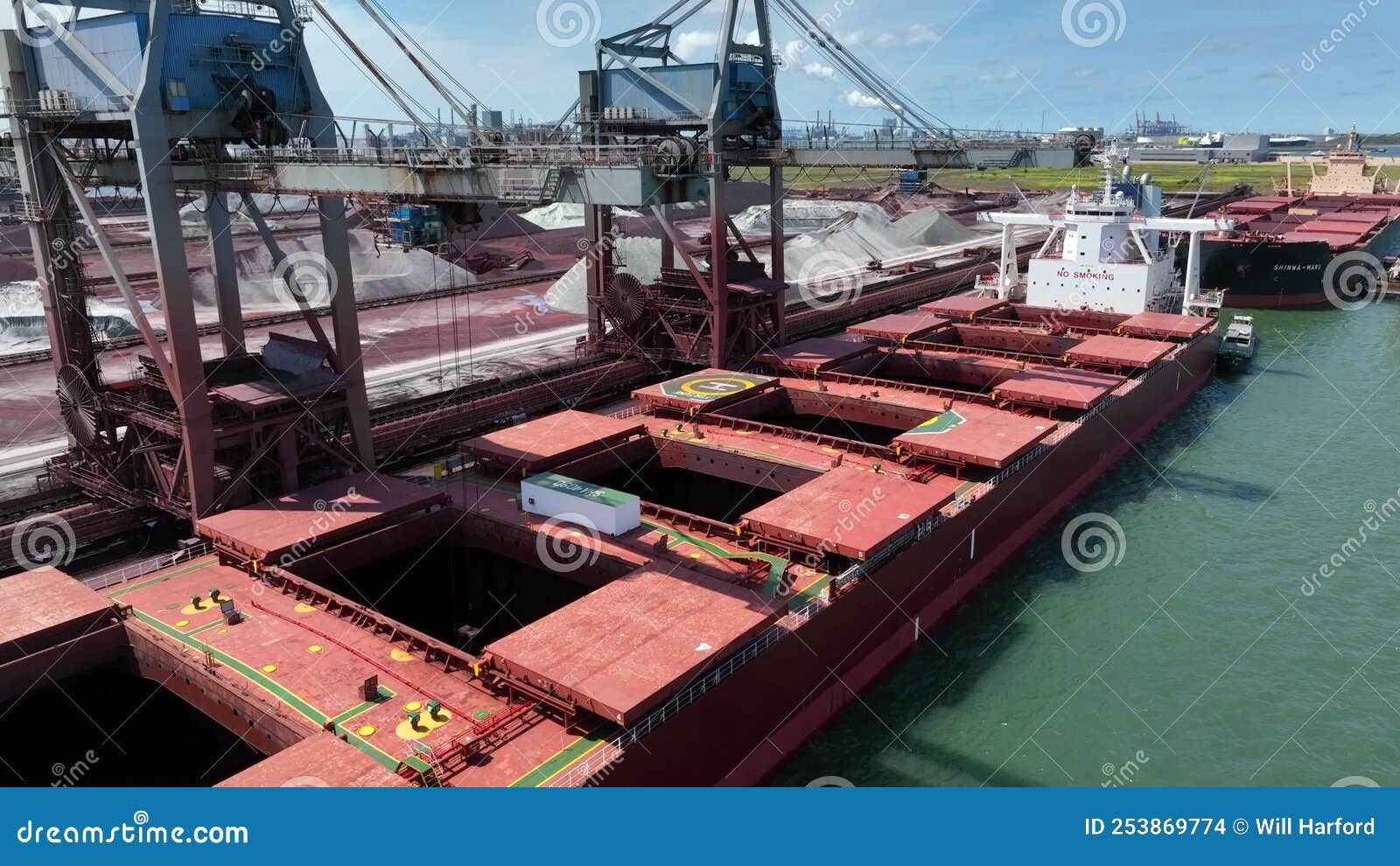 Bulk Carrier Ship Offloading Cargo by Crane for Processing Stock Footage - Video of commodities ...
