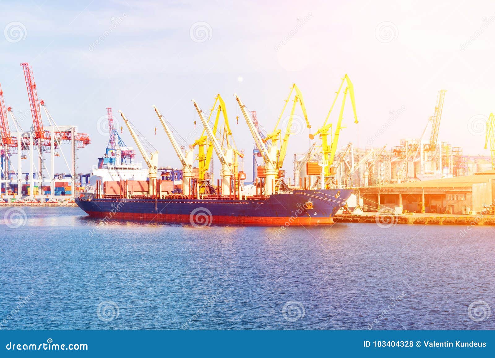Bulk Carrier Ship in the Port on Loading. Bulk Cargo Ship Under Port ...