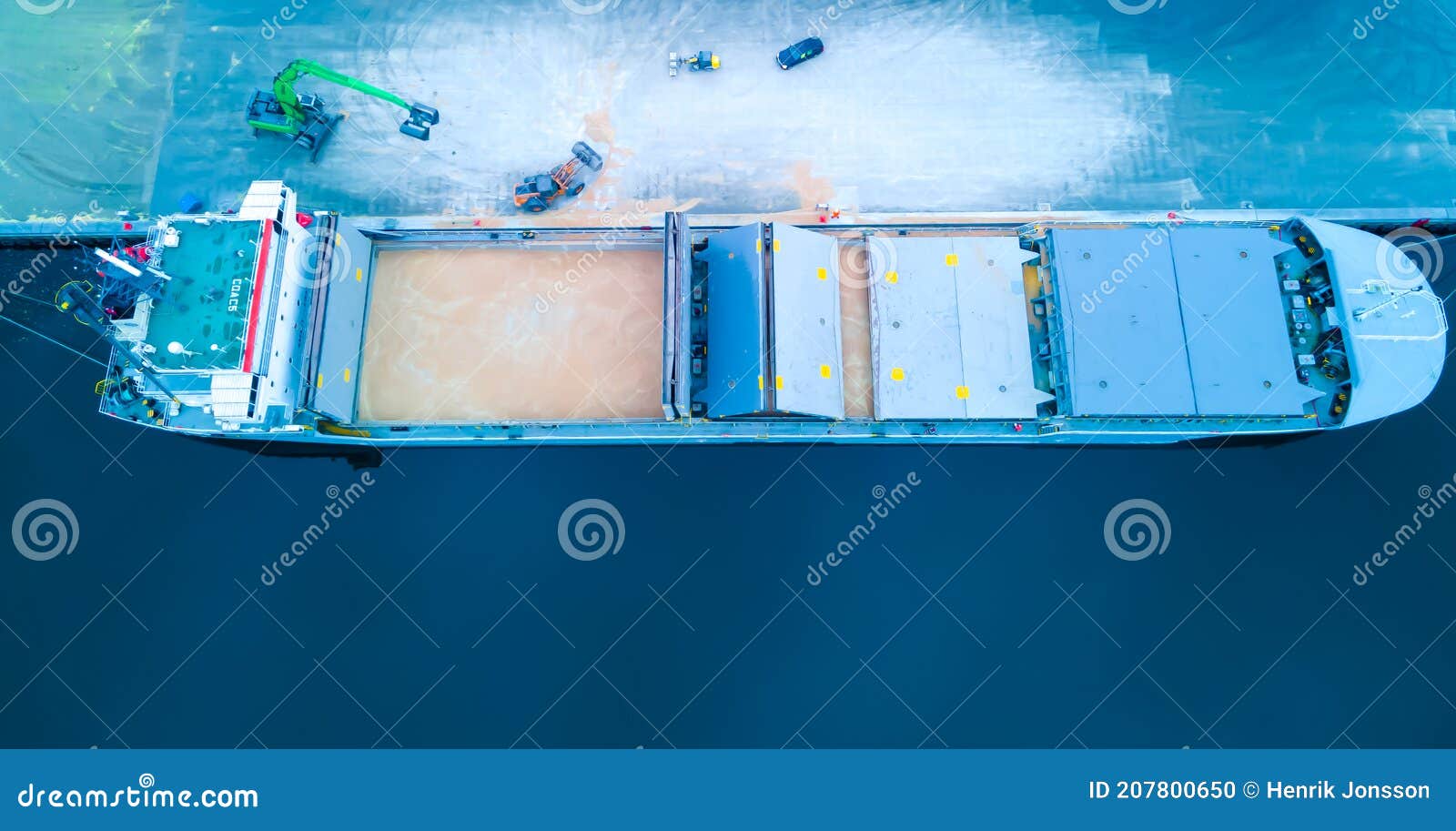 Bulk Carrier Ship at Port Loading Grain into Open Holds Stock Photo ...