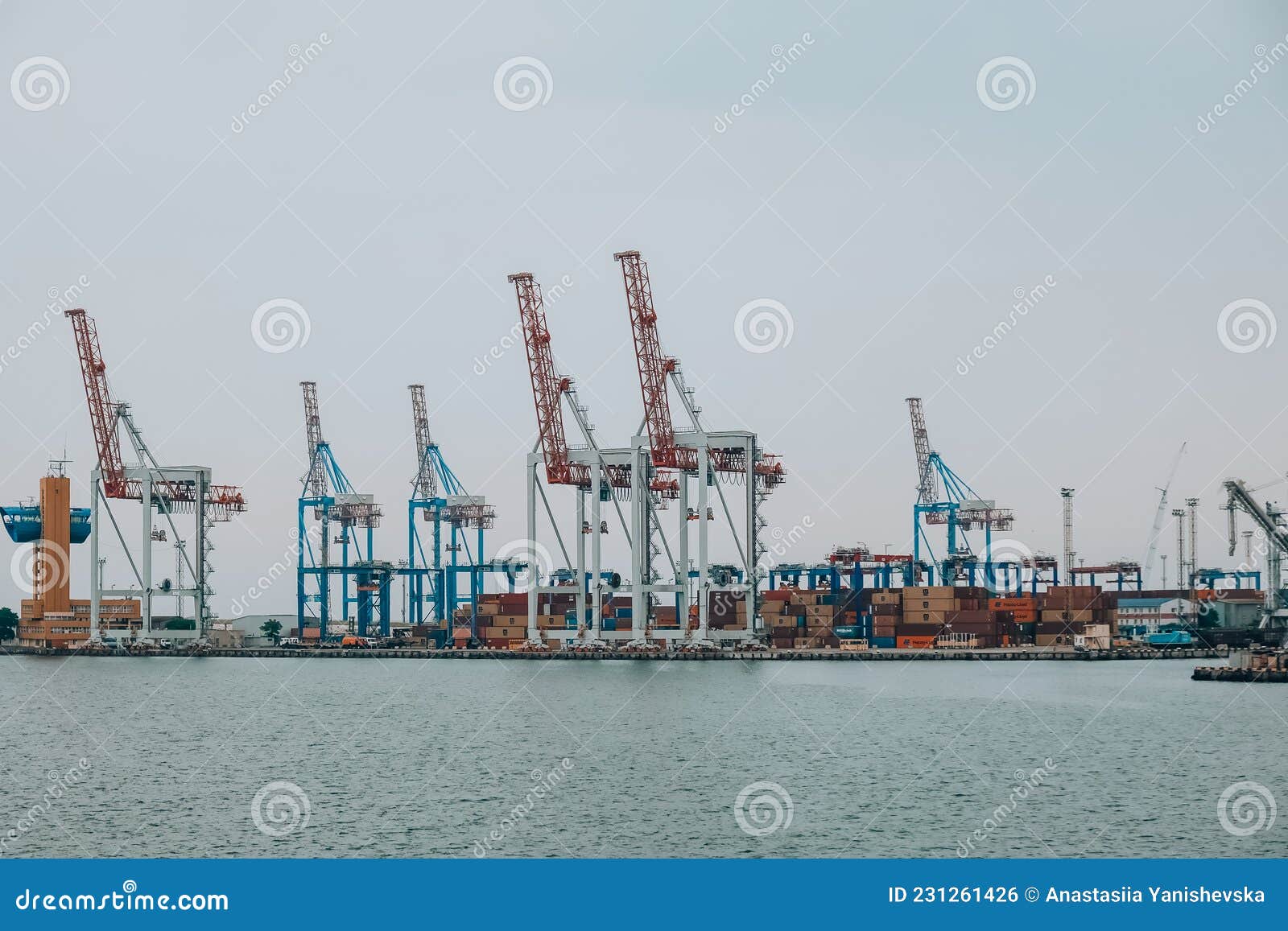 Bulk Carrier Ship Under Load of Clinker Cargo Loading by Shore Cranes ...