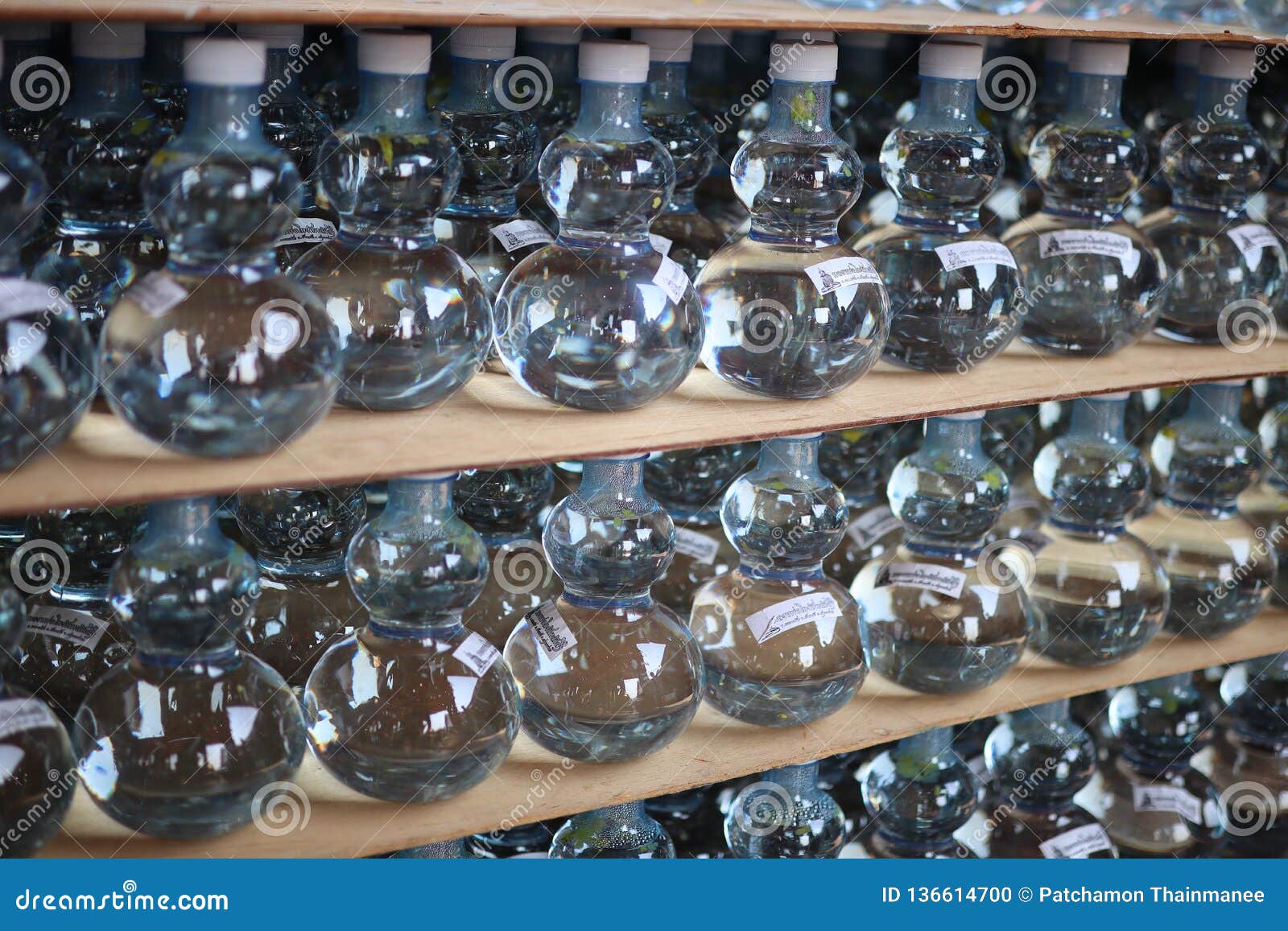 Bulk Drinking Water Bottles Arranged on Shelves Stock Photo - Image of ...