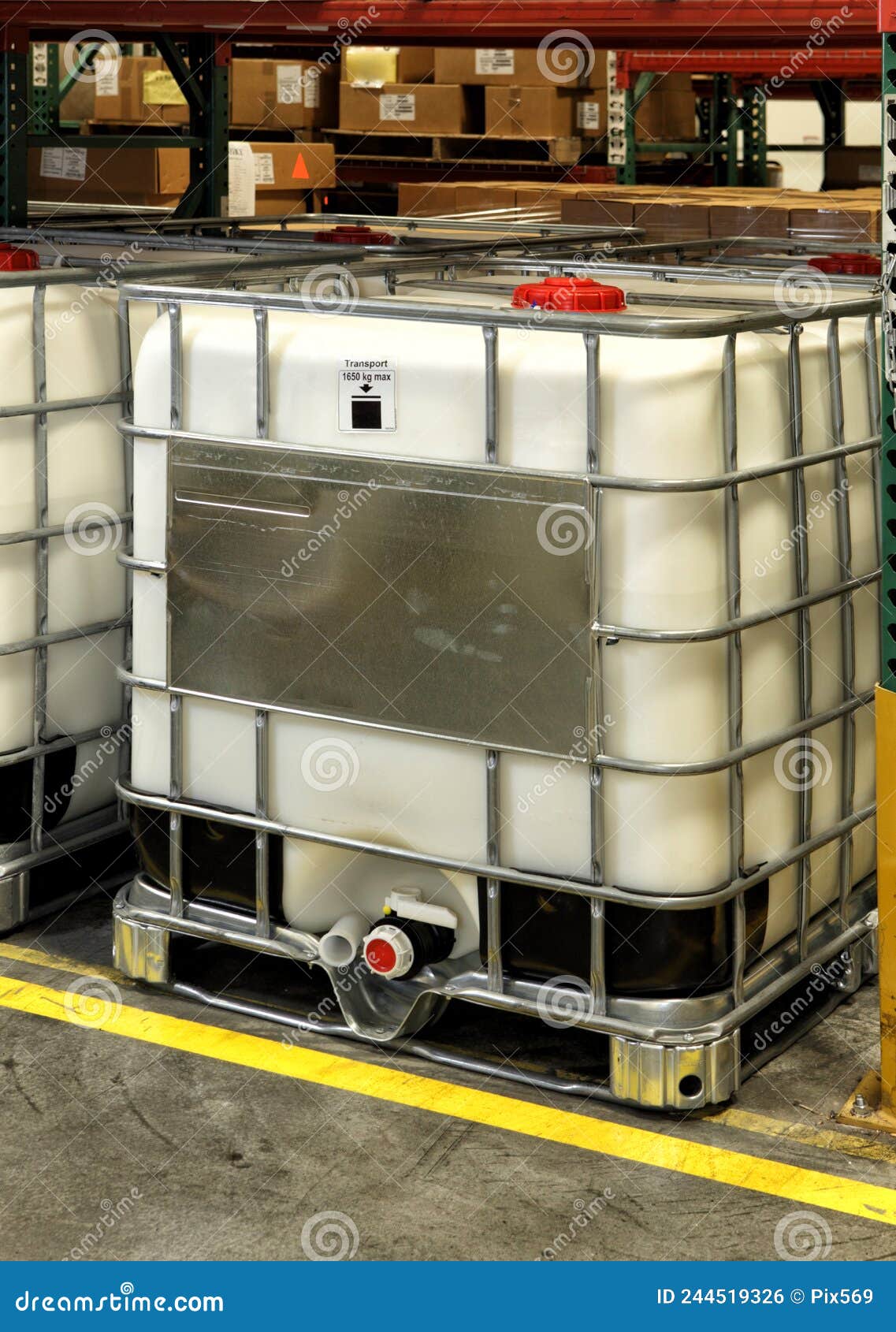 Bulk Fluid Shipping Container, in a Warehouse. Stock Photo - Image of ...