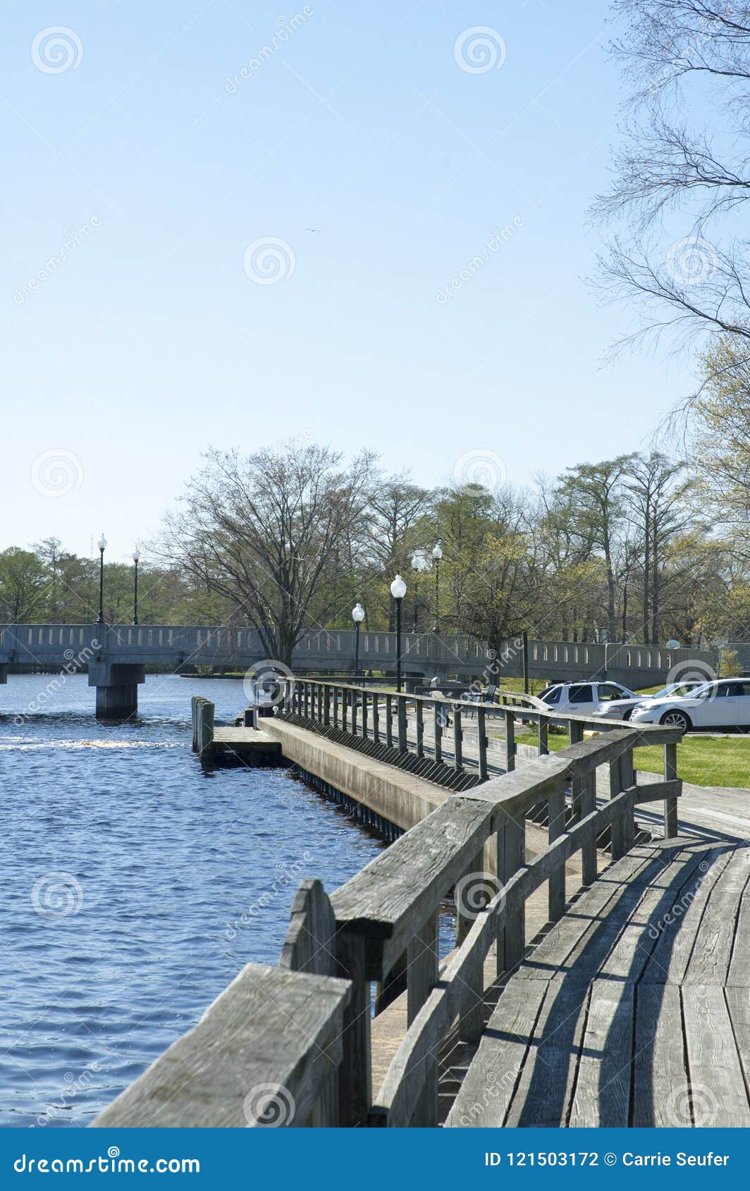 River waterfront Walkway stock photo. Image of lake - 121503172