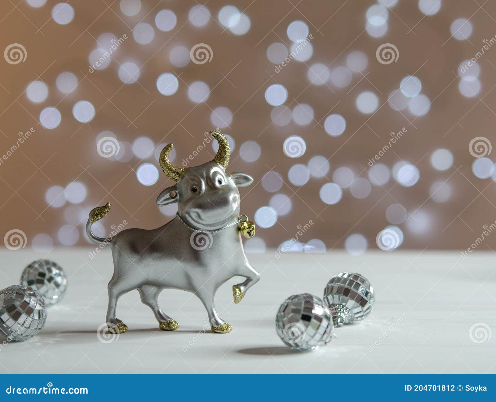 Bull and Mirror Balls on a Black Top Stock Photo - Image of holiday ...