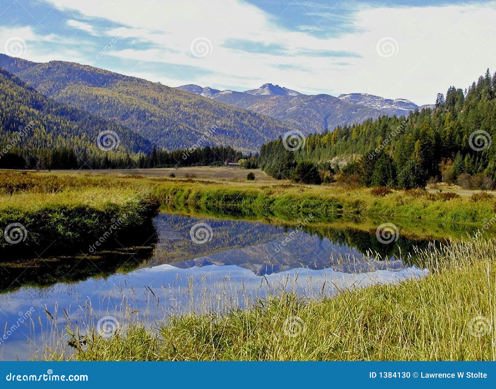 Bull River Reflection stock photo. Image of mountains - 1384130