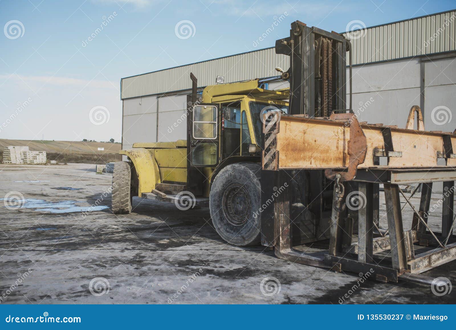 Bulldozemachine with crane stock image. Image of lifter - 135530237