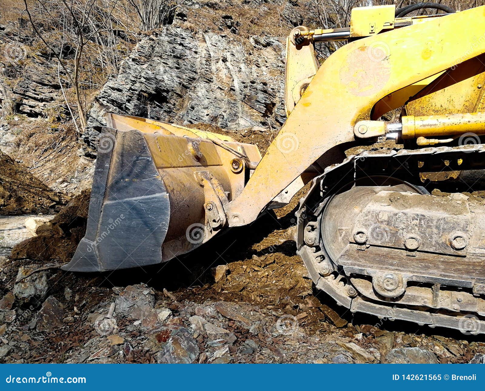 Bulldozer Cleaning the Road Next To the River. Stock Image - Image of ...