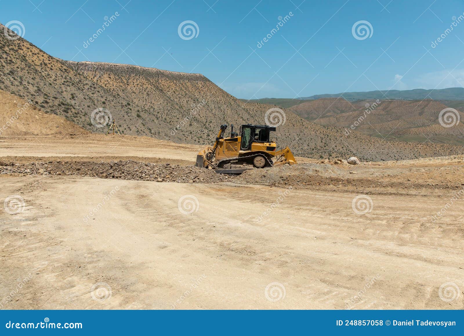 Bulldozer at a Construction Site Stock Photo - Image of rock, ground ...