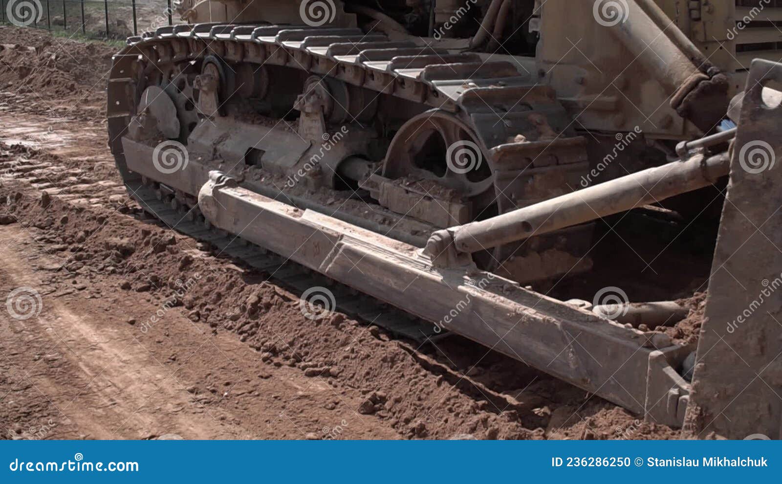 Close-up a Bulldozer, Dozer at a Construction Site is Going in Reverse ...