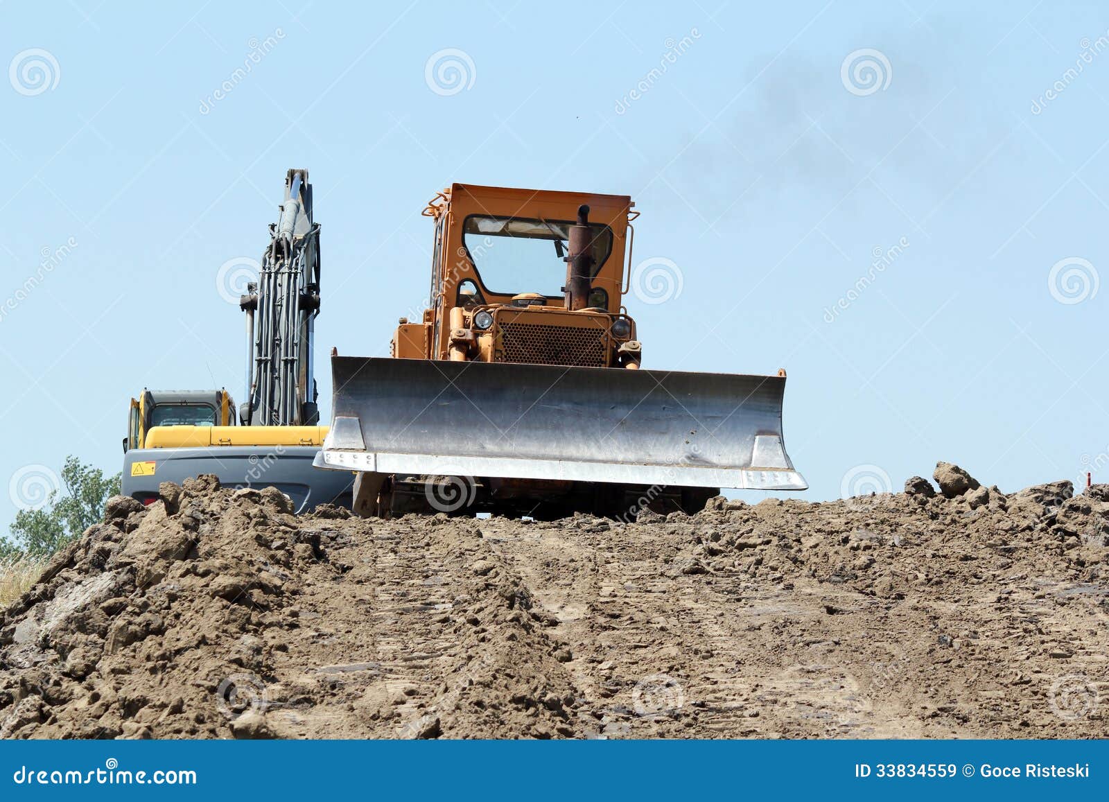 Bulldozer and Excavator on Road Construction Stock Image - Image of ...