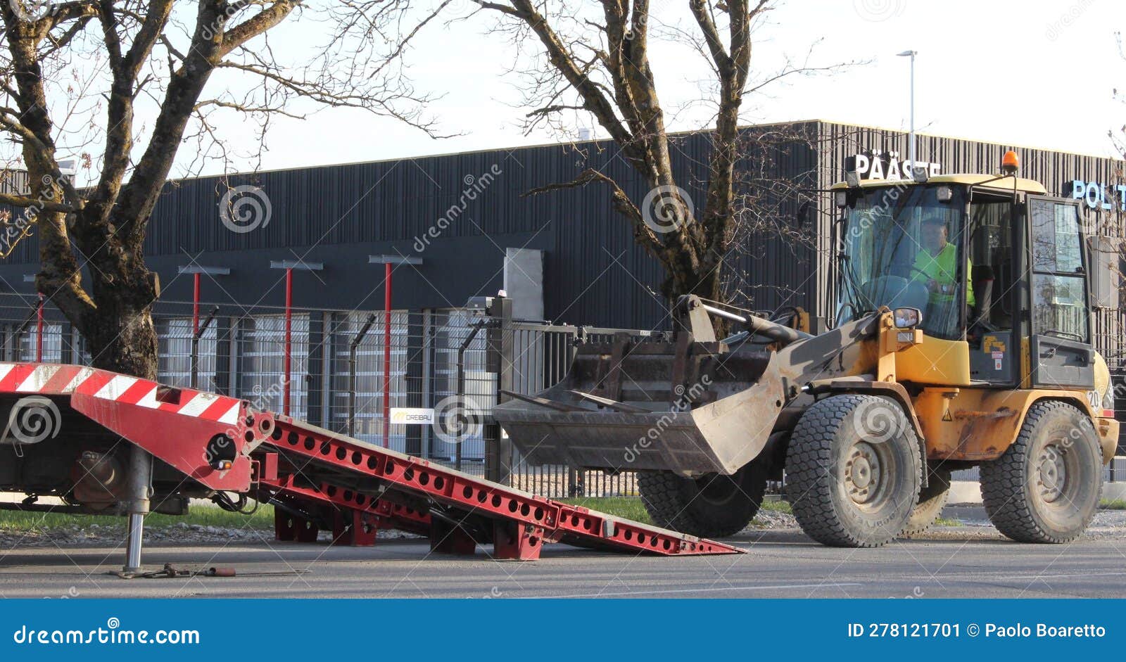 Bulldozer that Gets on a Truck To Be Transported Editorial Photo ...