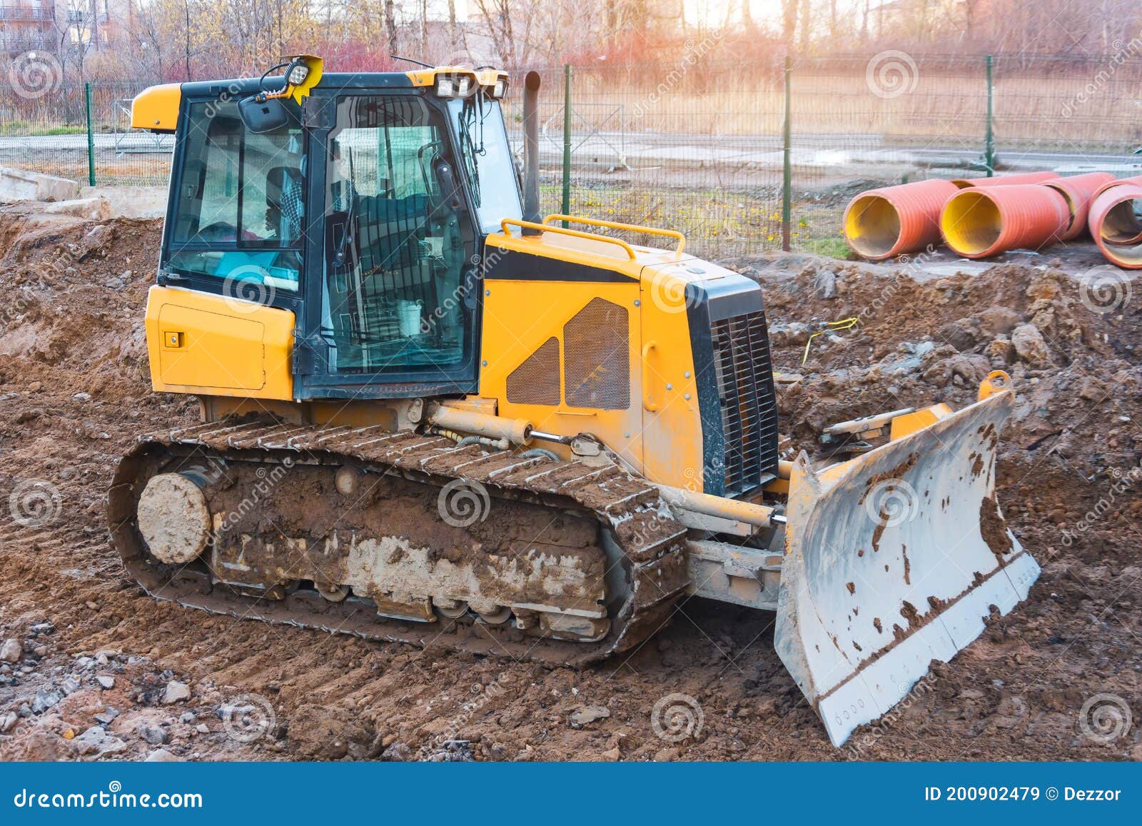 The Bulldozer Levels the Ground during the Construction of Engineering ...