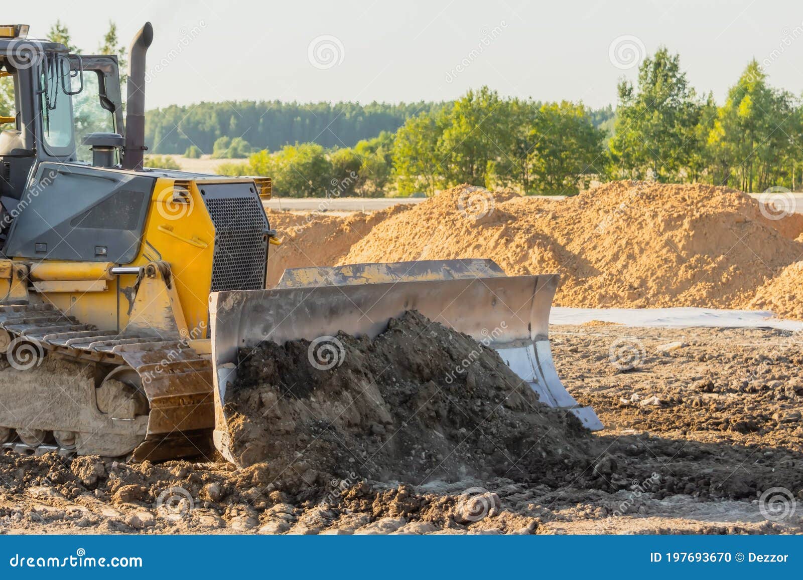 The Bulldozer Levels The Ground During The Construction Of Engineering ...