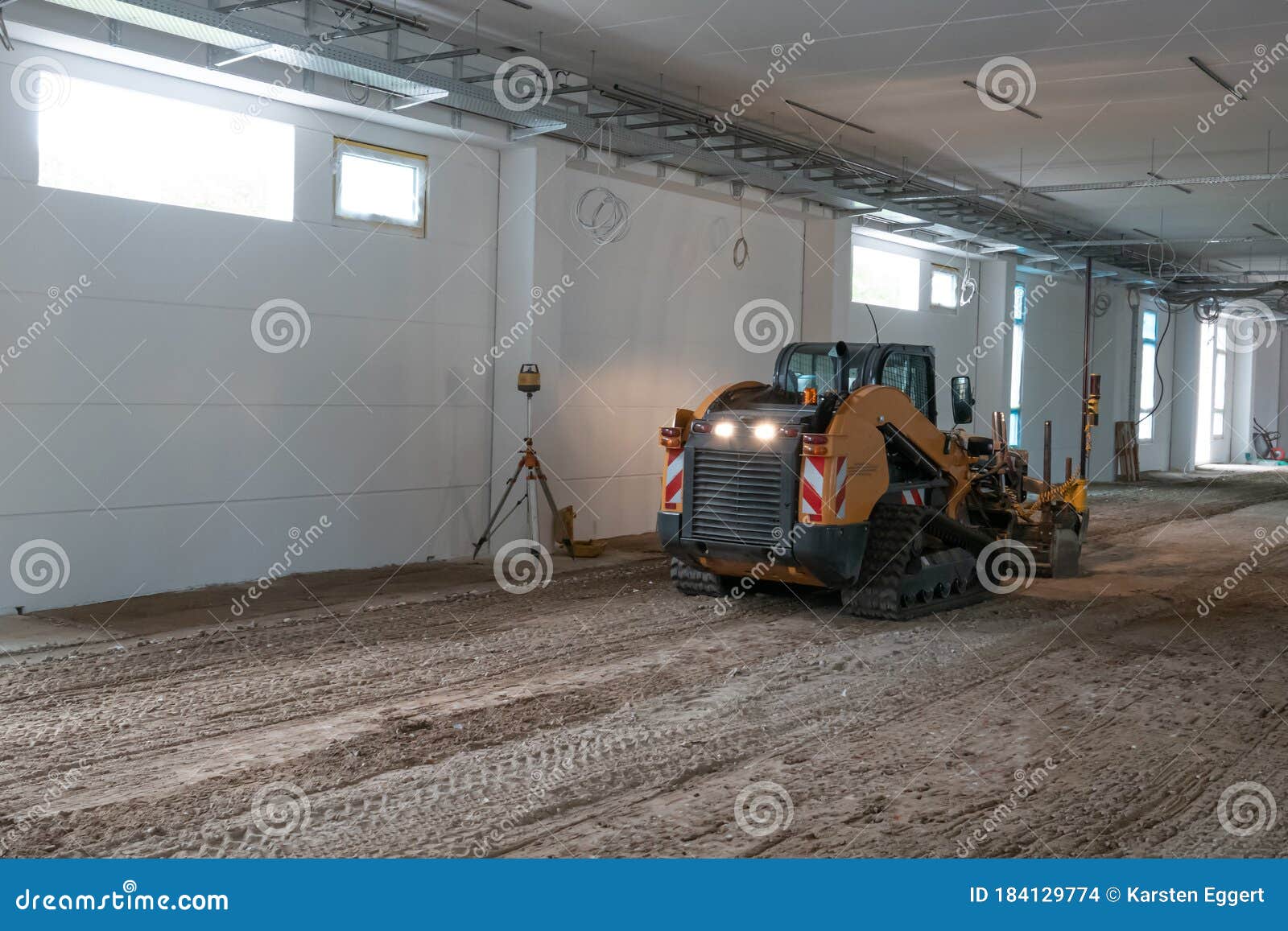 Bulldozer Levels the Ground on a Construction Site Stock Photo - Image ...