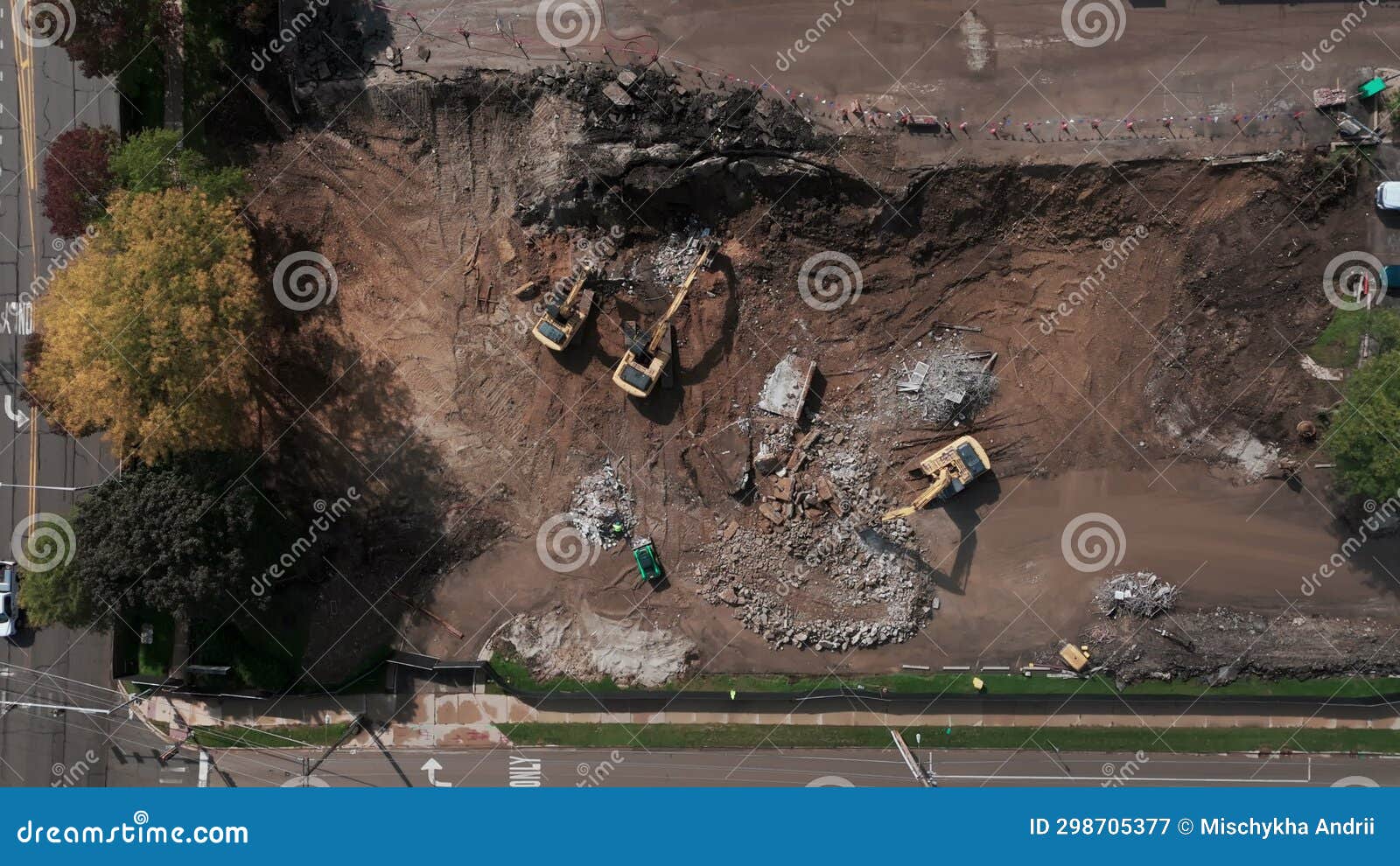 A Bulldozer Levels a Plot of Land for Construction Development. Top ...