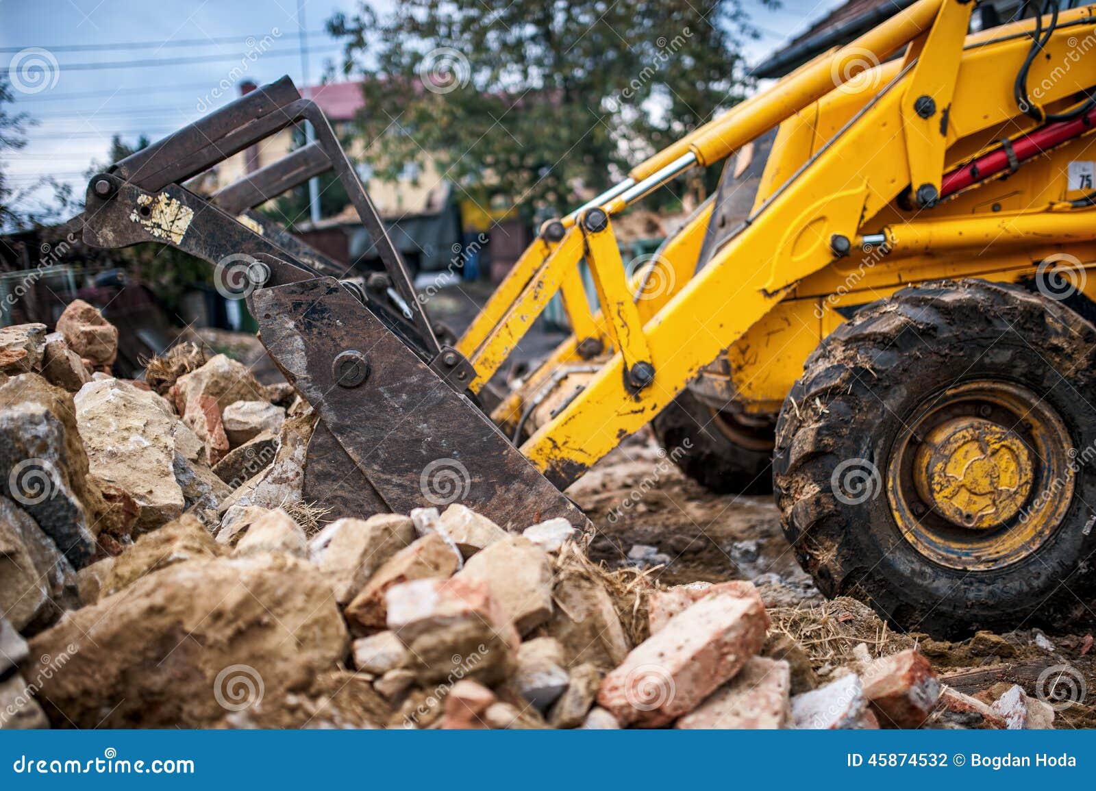 Bulldozer Loading Demolition Debris and Concrete Waste Stock Photo ...