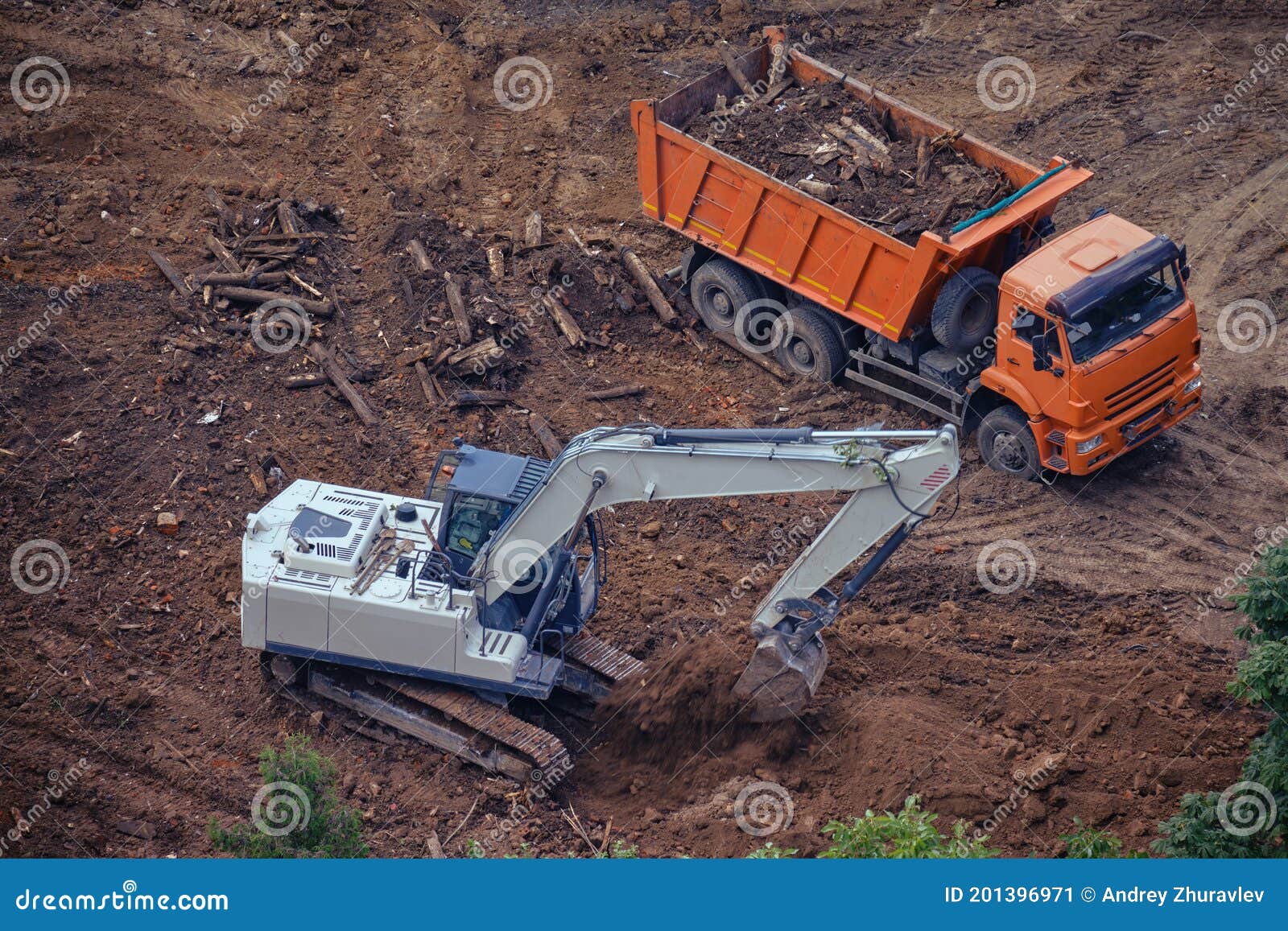 Bulldozer Loads Soil into an Orange Truck, Top View Stock Image - Image ...