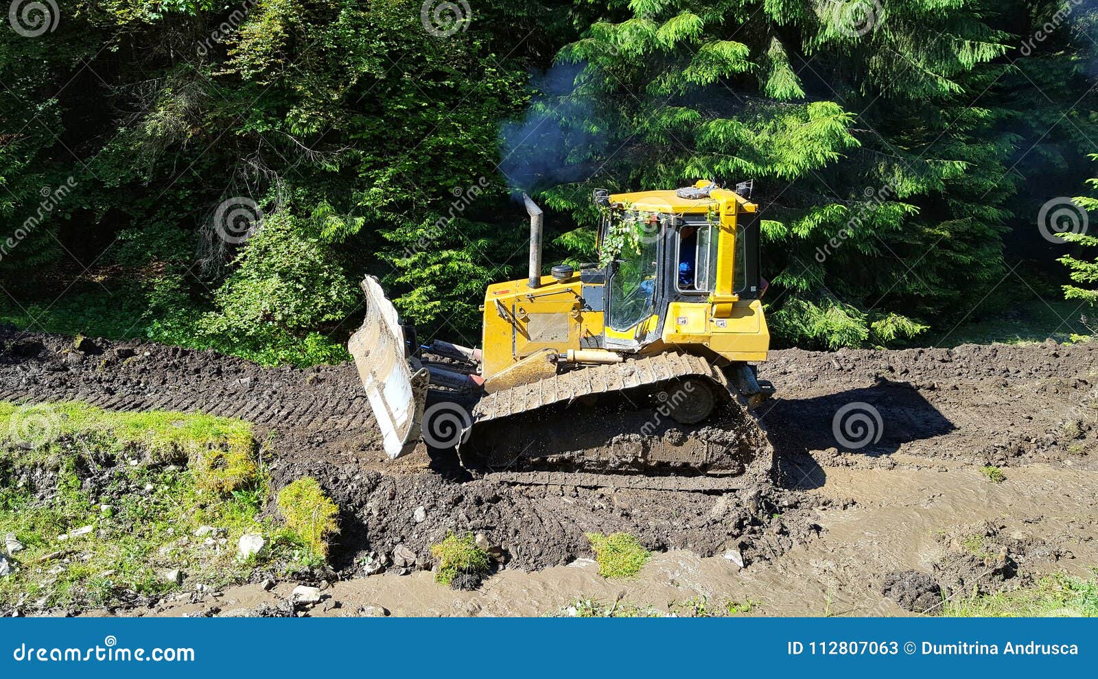 The bulldozer makes way stock image. Image of digger - 112807063
