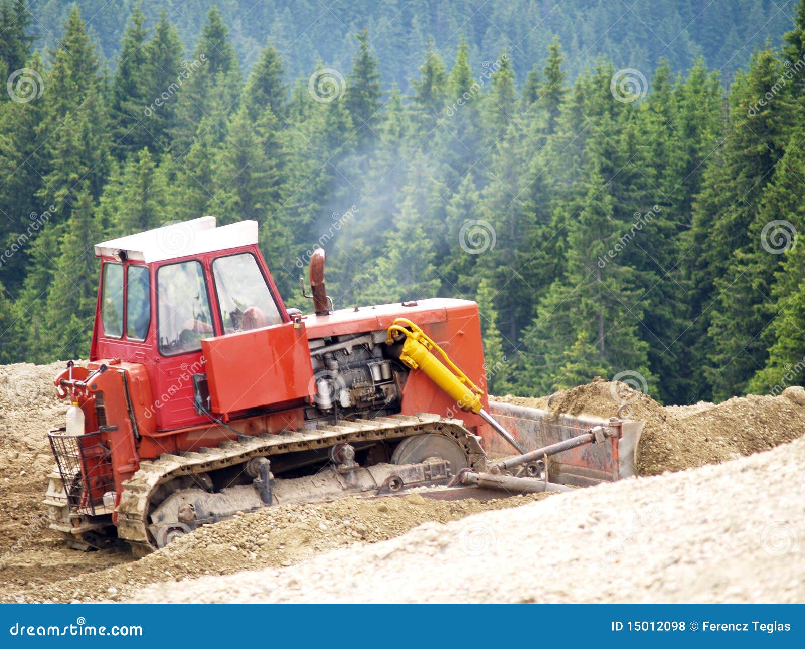 Bulldozer in mountains stock photo. Image of landscaping - 15012098