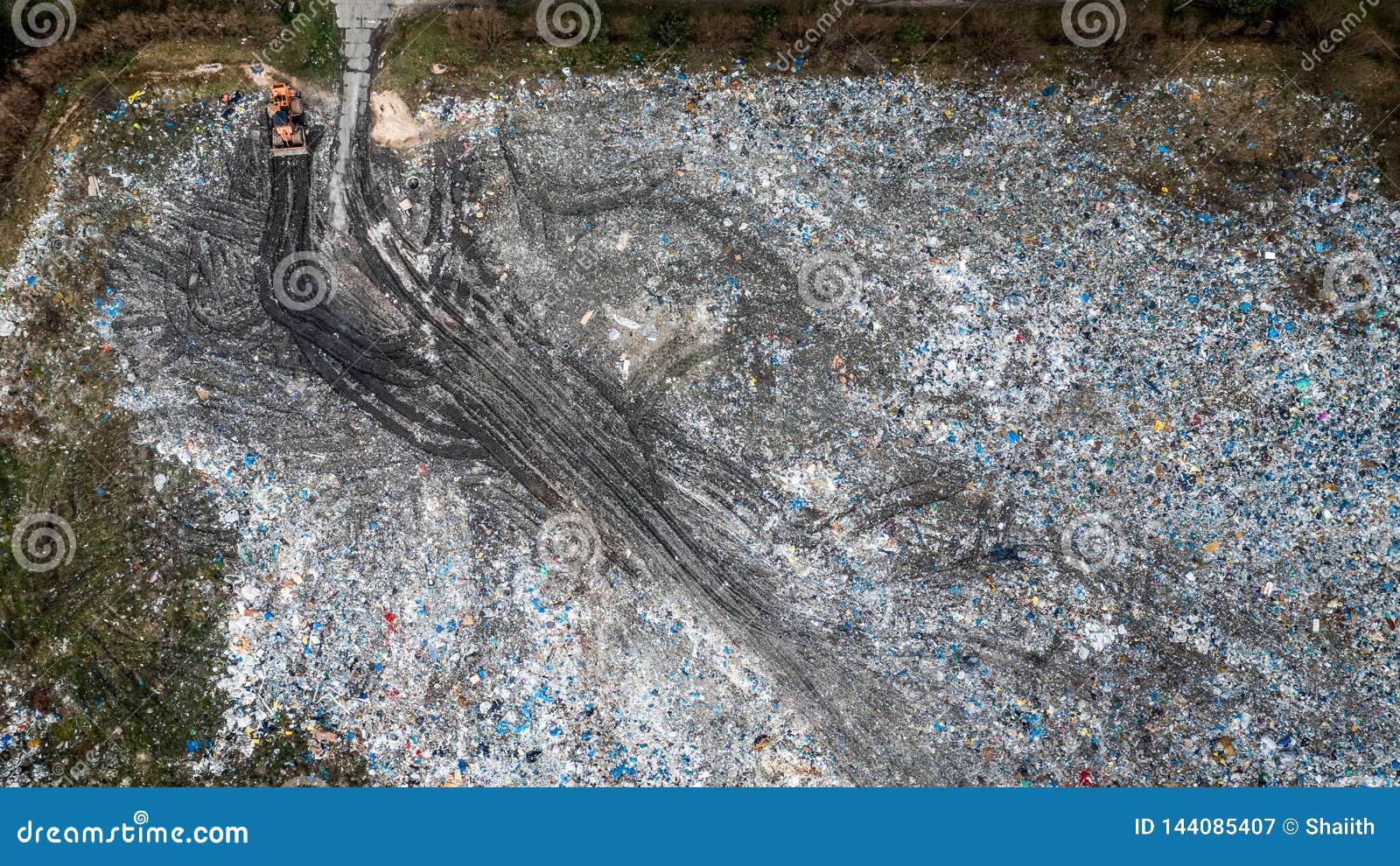 Bulldozer on the Open Solid Waste Dump, Pollution from Waste Stock ...