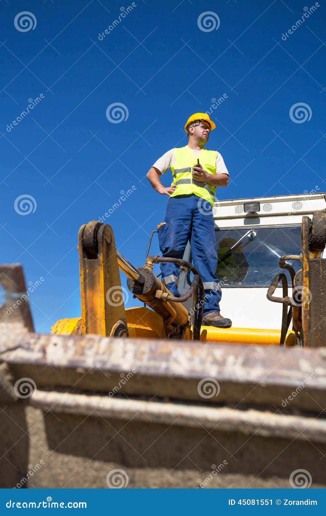 Bulldozer operator stock image. Image of helmet, industrial - 45081551