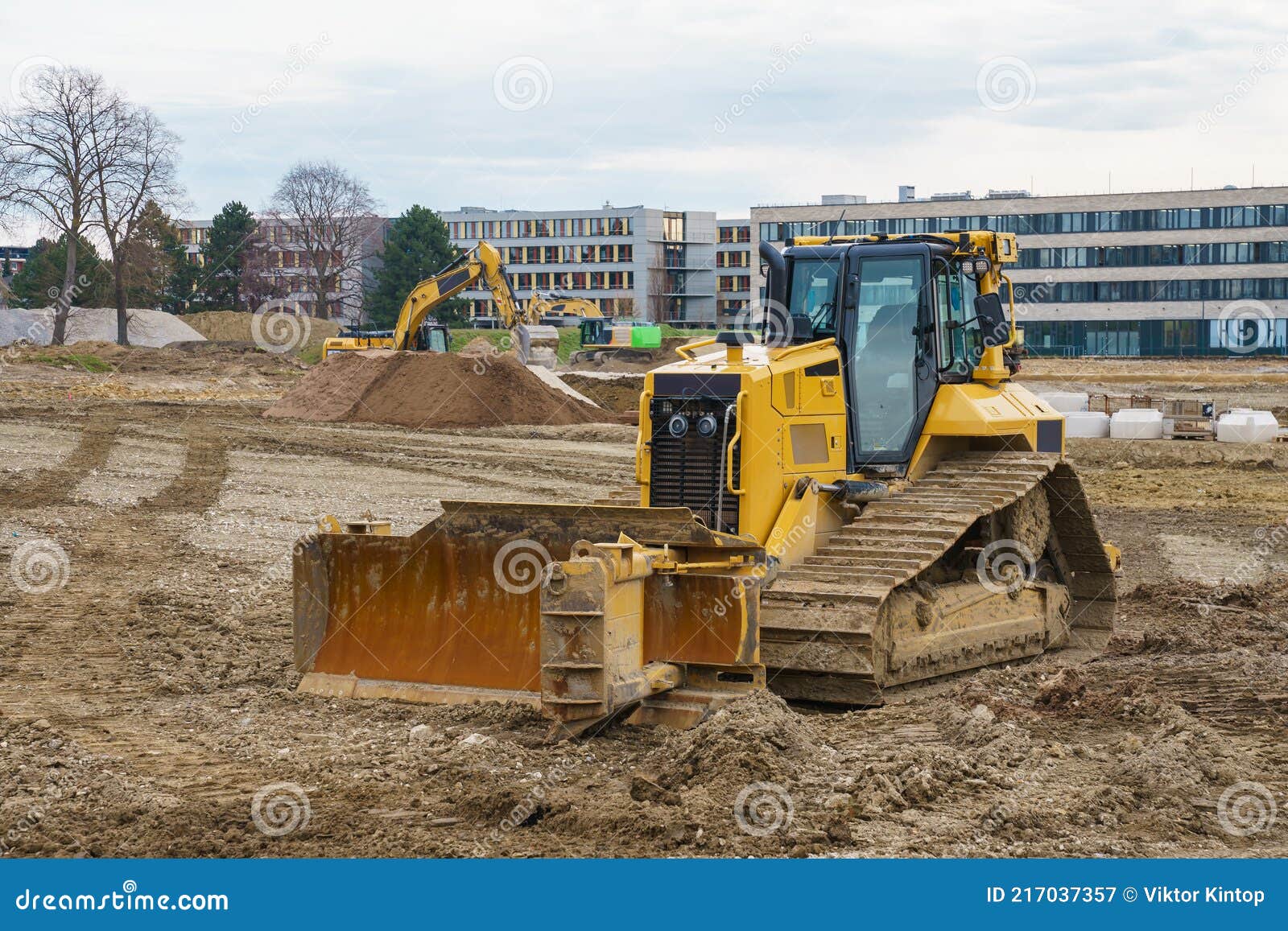 Construction Equipment, A Dump Truck, An Excavator And A Tractor Dig ...