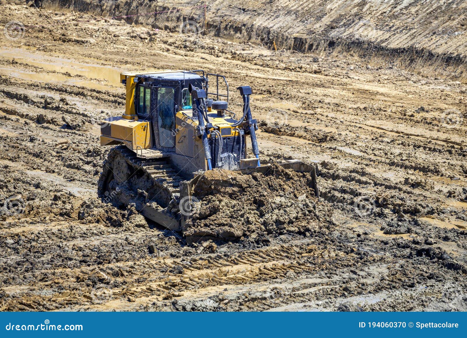 Bulldozer Push Dirt in Excavation Pit Stock Photo - Image of ...